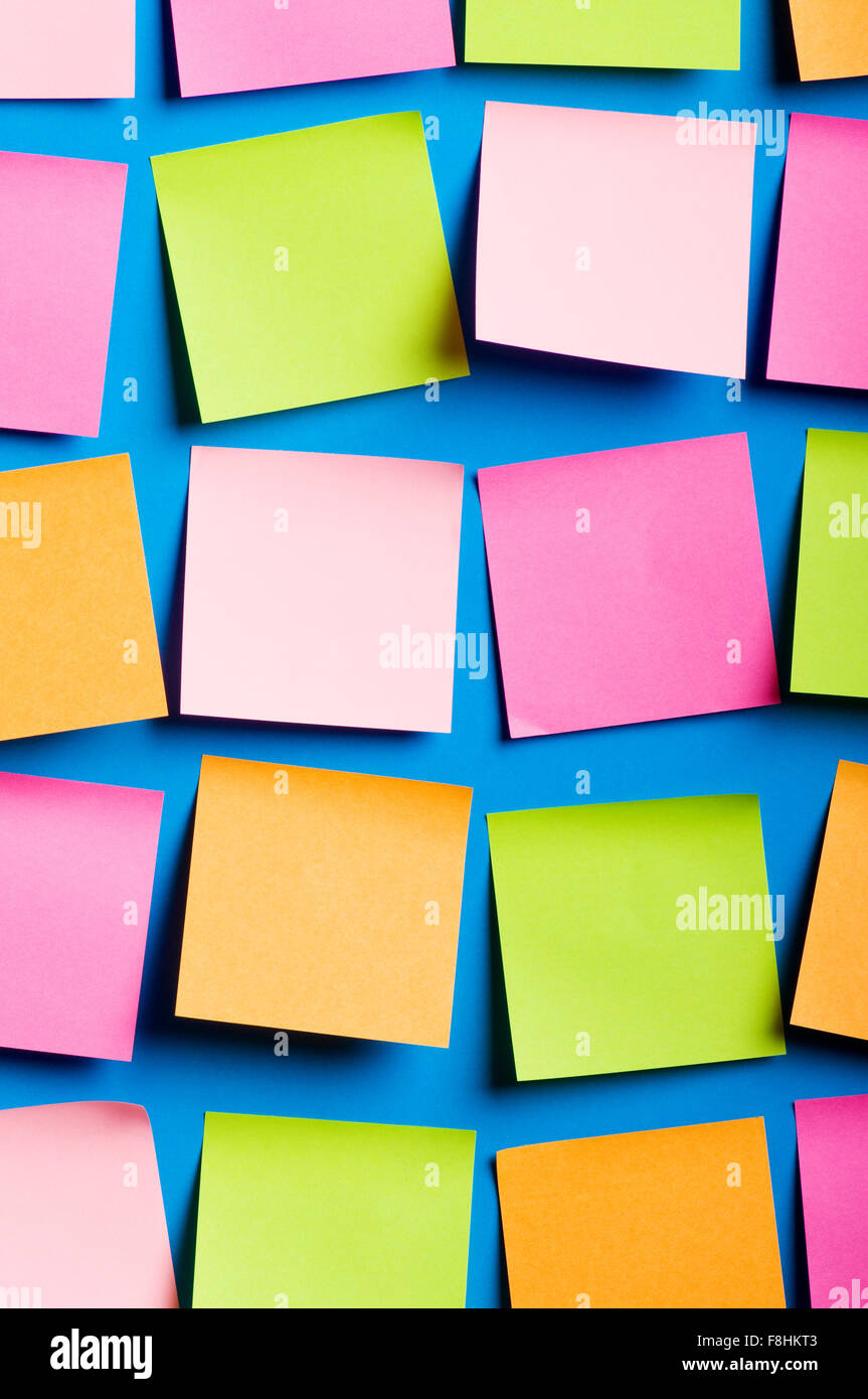Reminder notes on the bright colorful paper Stock Photo - Alamy