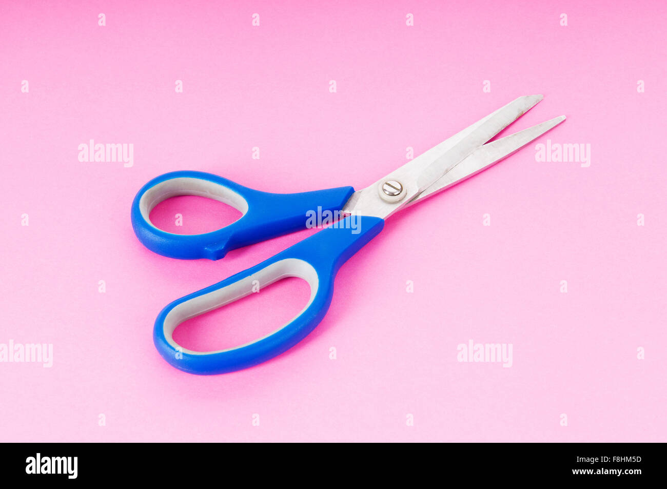 Colorful scissors on the color paper background Stock Photo - Alamy