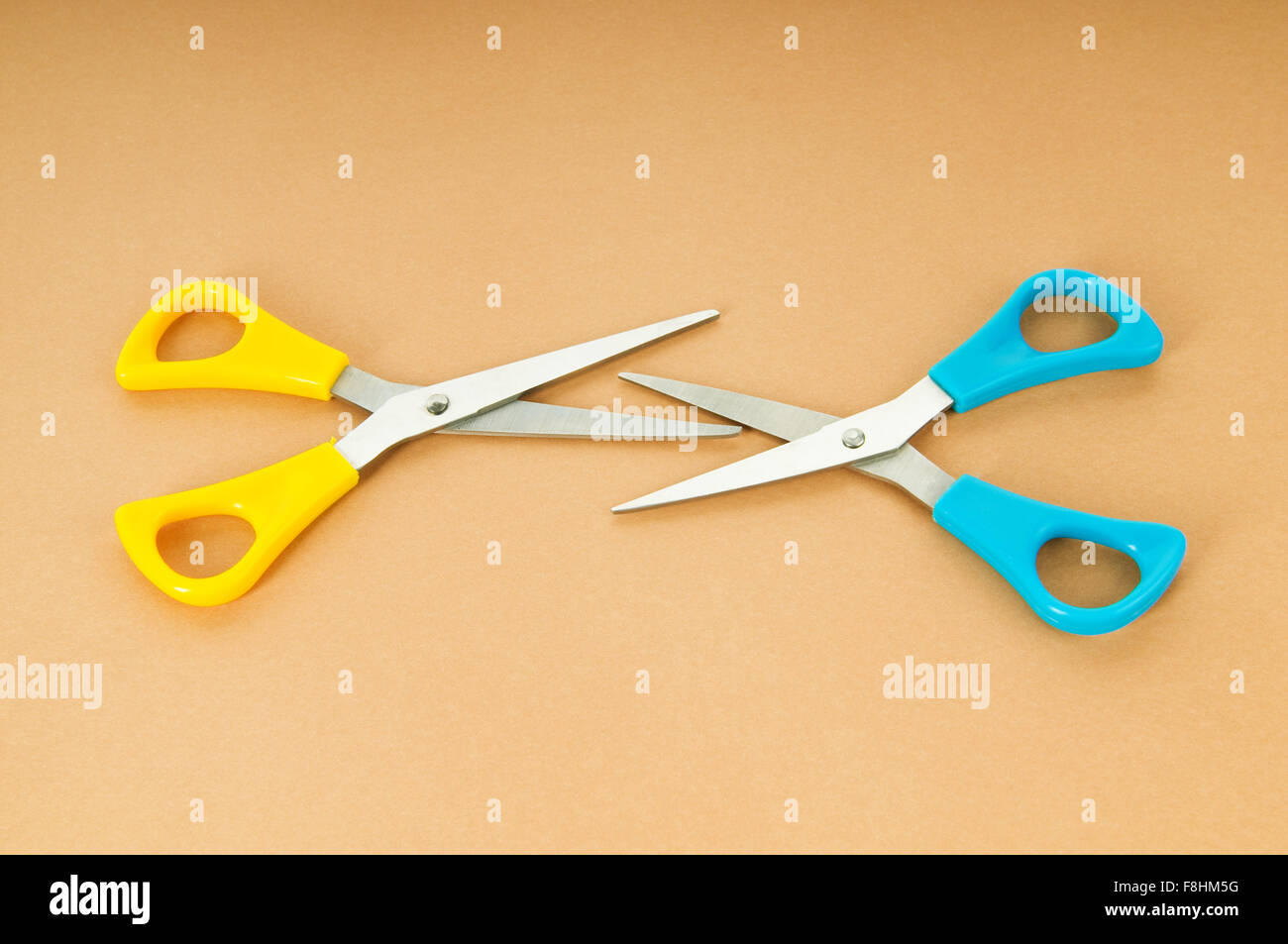 Colorful scissors on the color paper background Stock Photo - Alamy