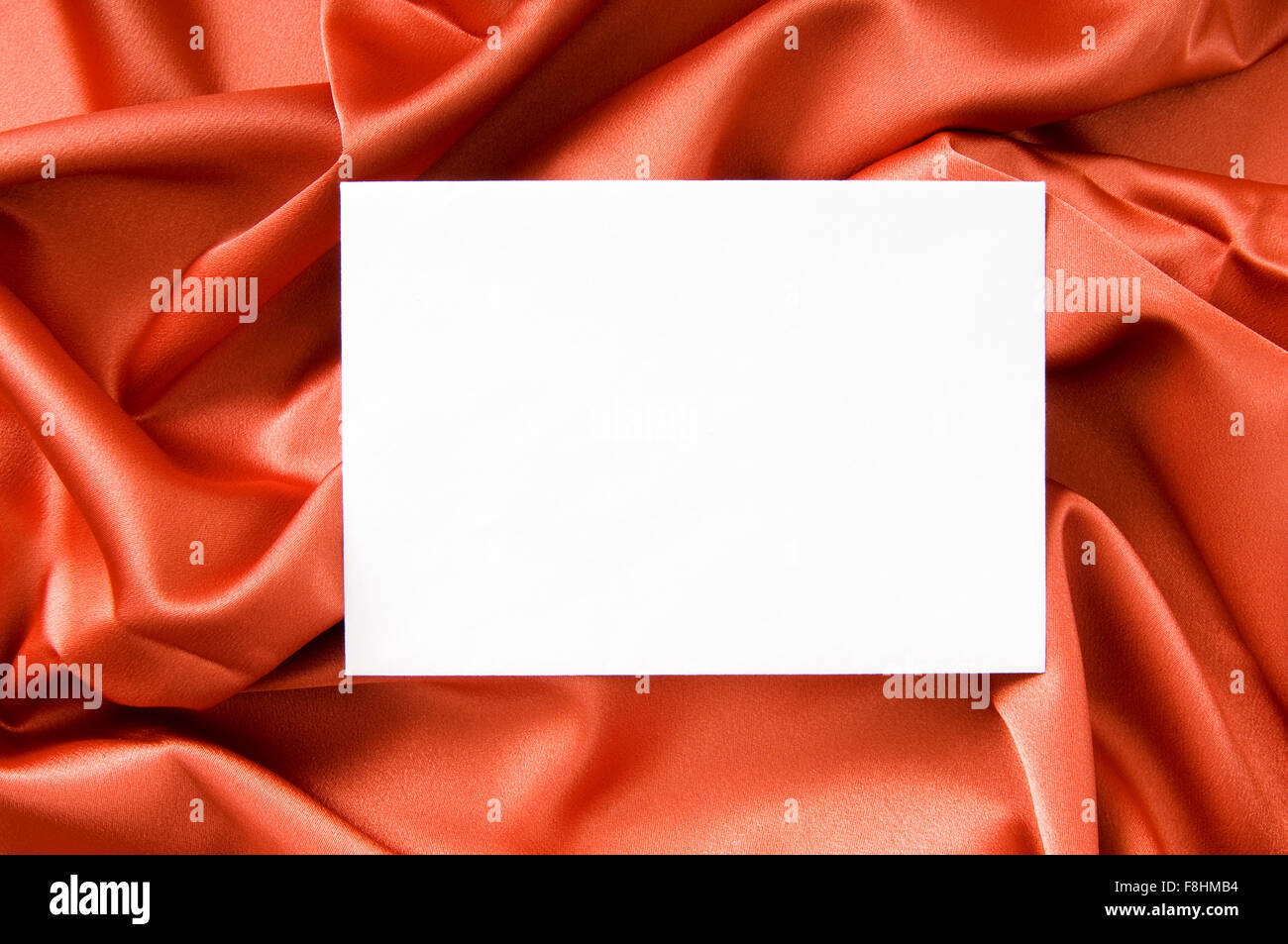 Blank message on the red satin background Stock Photo - Alamy
