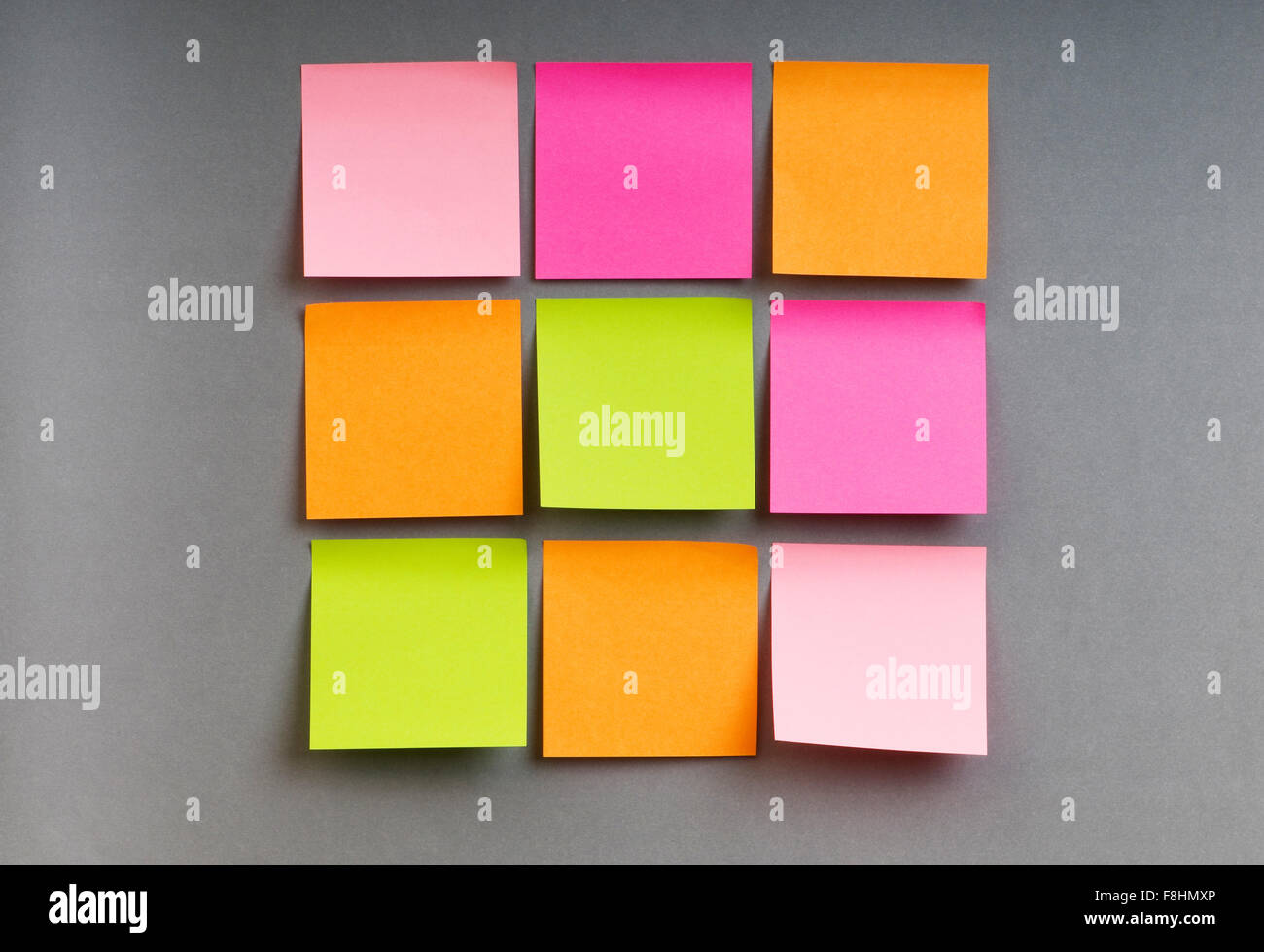 Reminder notes on the bright colorful paper Stock Photo - Alamy