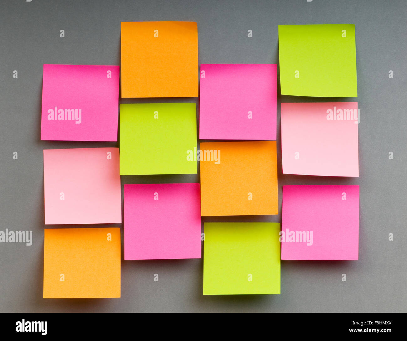 Reminder notes on the bright colorful paper Stock Photo - Alamy