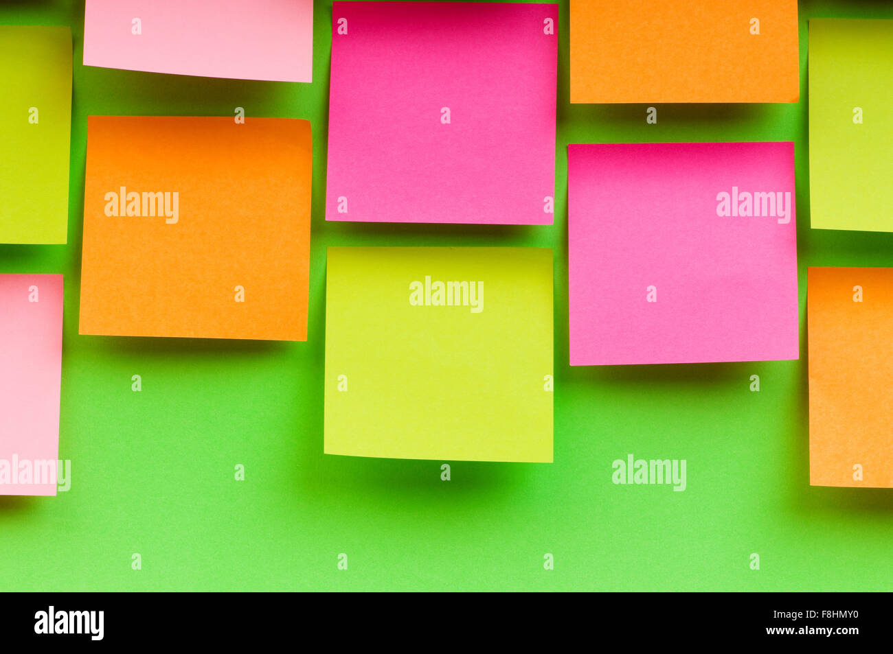 Reminder notes on the bright colorful paper Stock Photo - Alamy