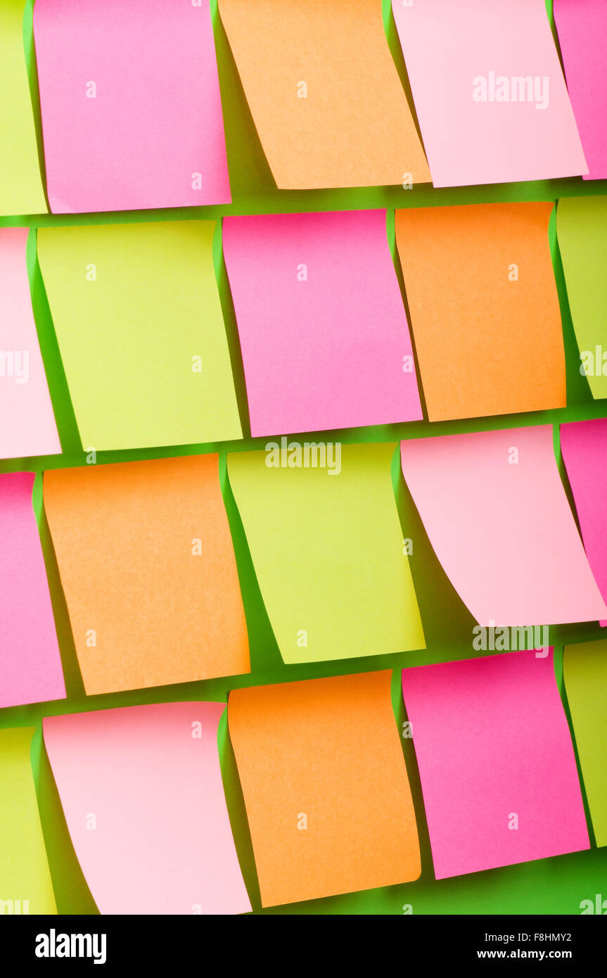 Reminder notes on the bright colorful paper Stock Photo - Alamy