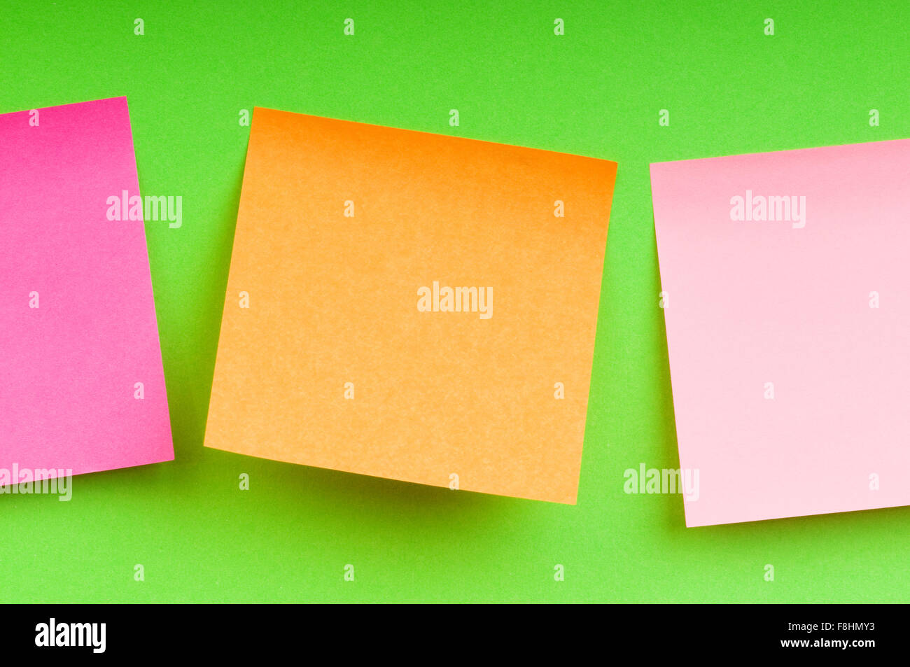 Reminder notes on the bright colorful paper Stock Photo - Alamy