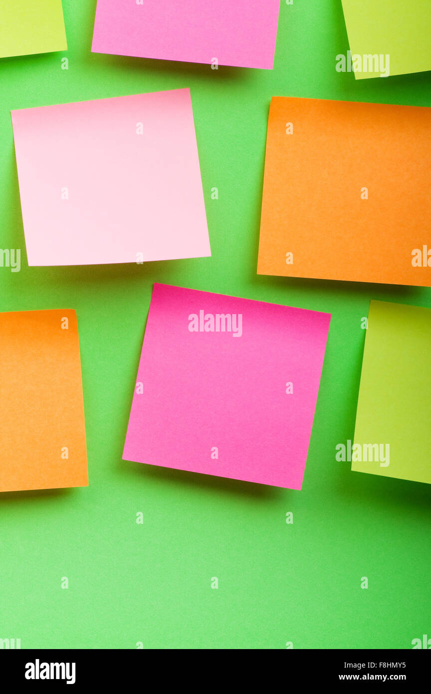 Reminder notes on the bright colorful paper Stock Photo - Alamy