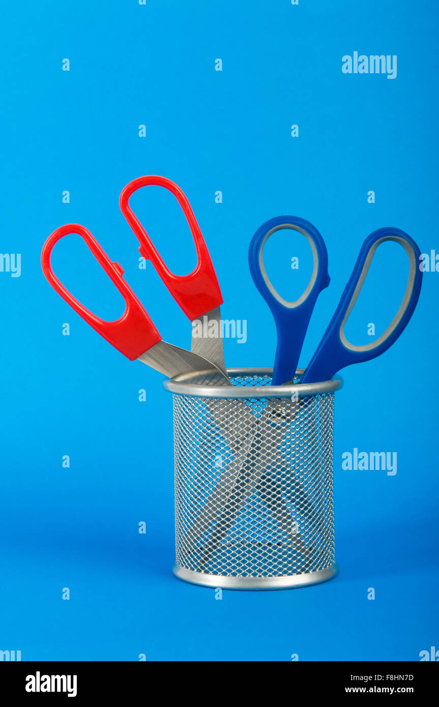 Colorful scissors on the color paper background Stock Photo - Alamy