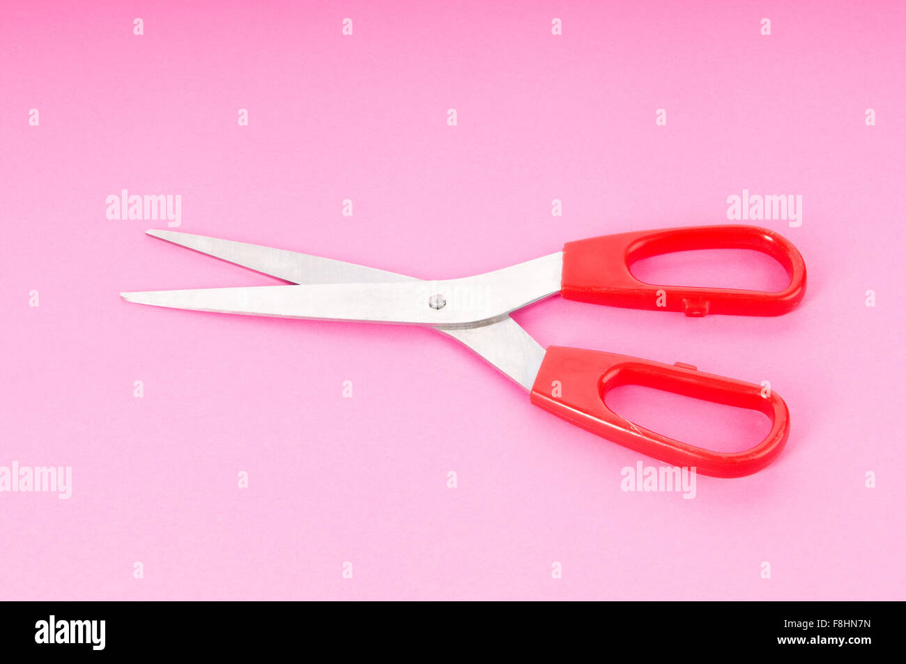 Colorful scissors on the color paper background Stock Photo - Alamy