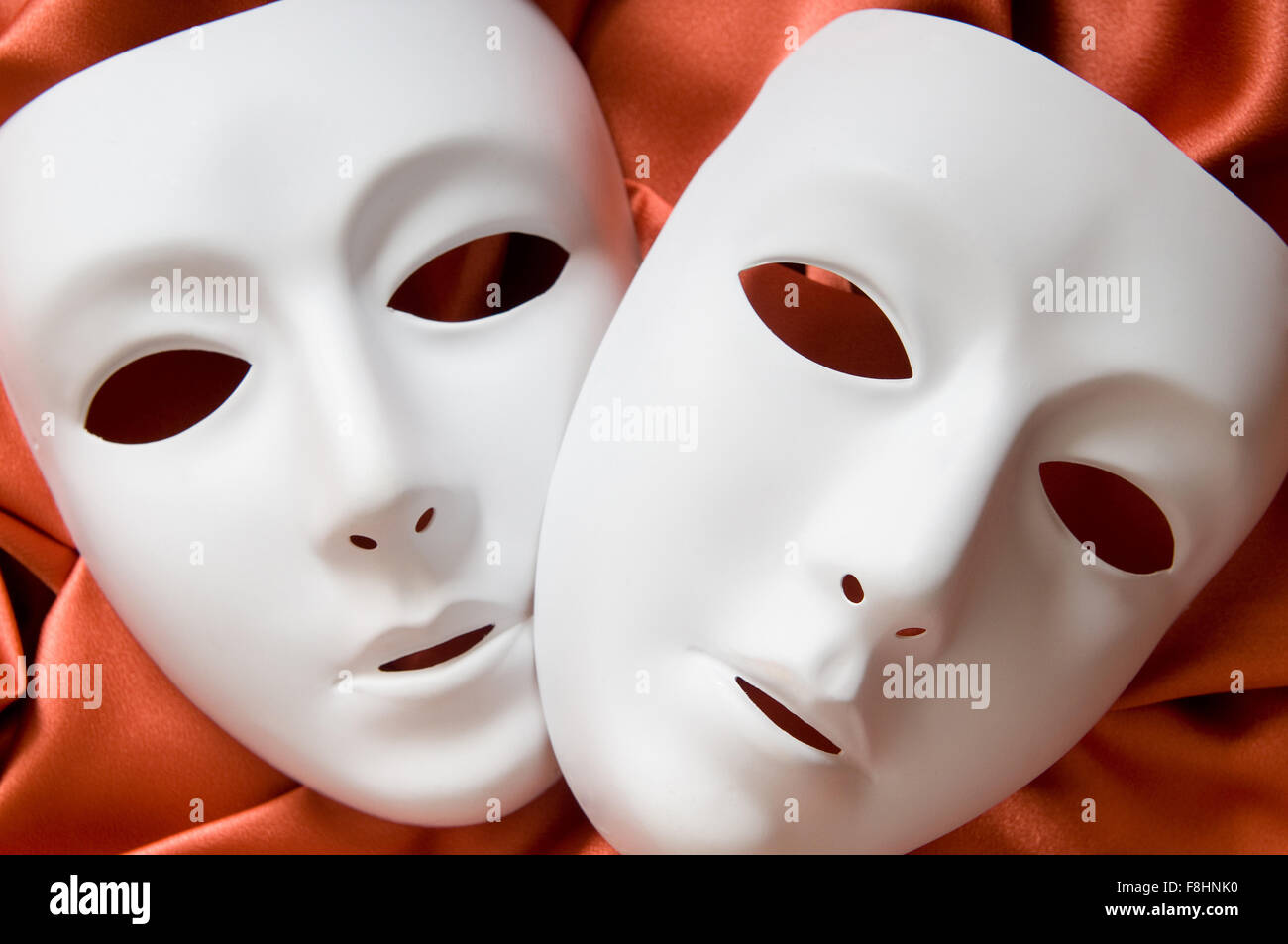 Theatre concept with the white plastic masks Stock Photo - Alamy