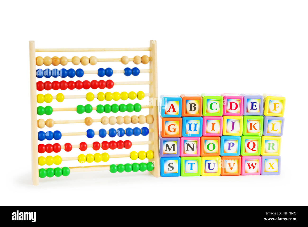 Alphabet blocks and abacus isolated on white Stock Photo - Alamy