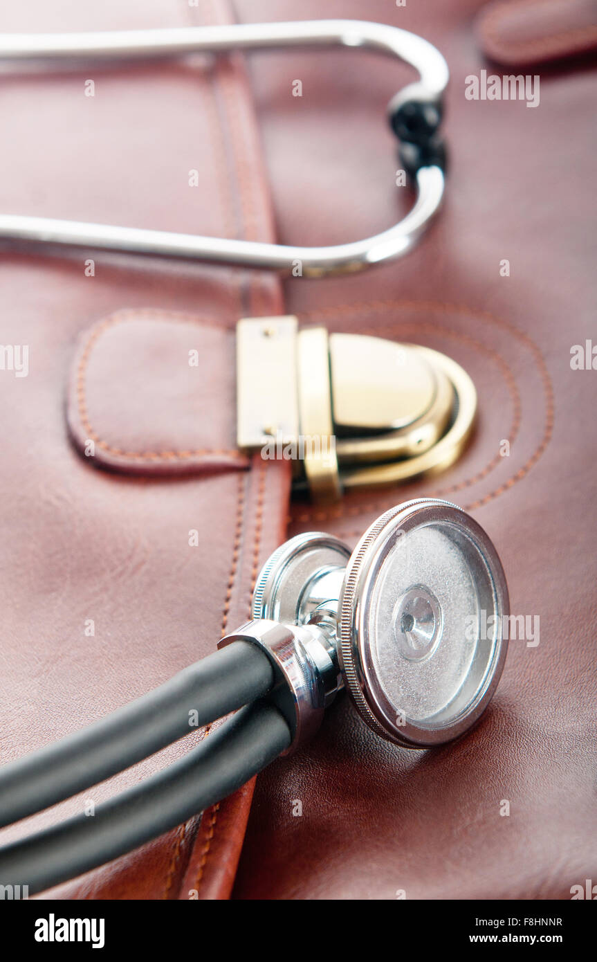 Leather briefcase and stethoscope hi-res stock photography and images ...