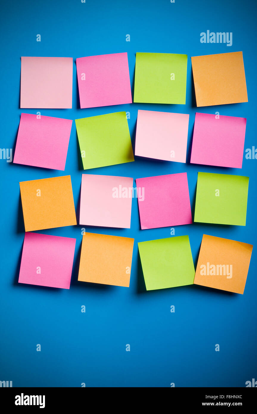 Reminder notes on the bright colorful paper Stock Photo - Alamy