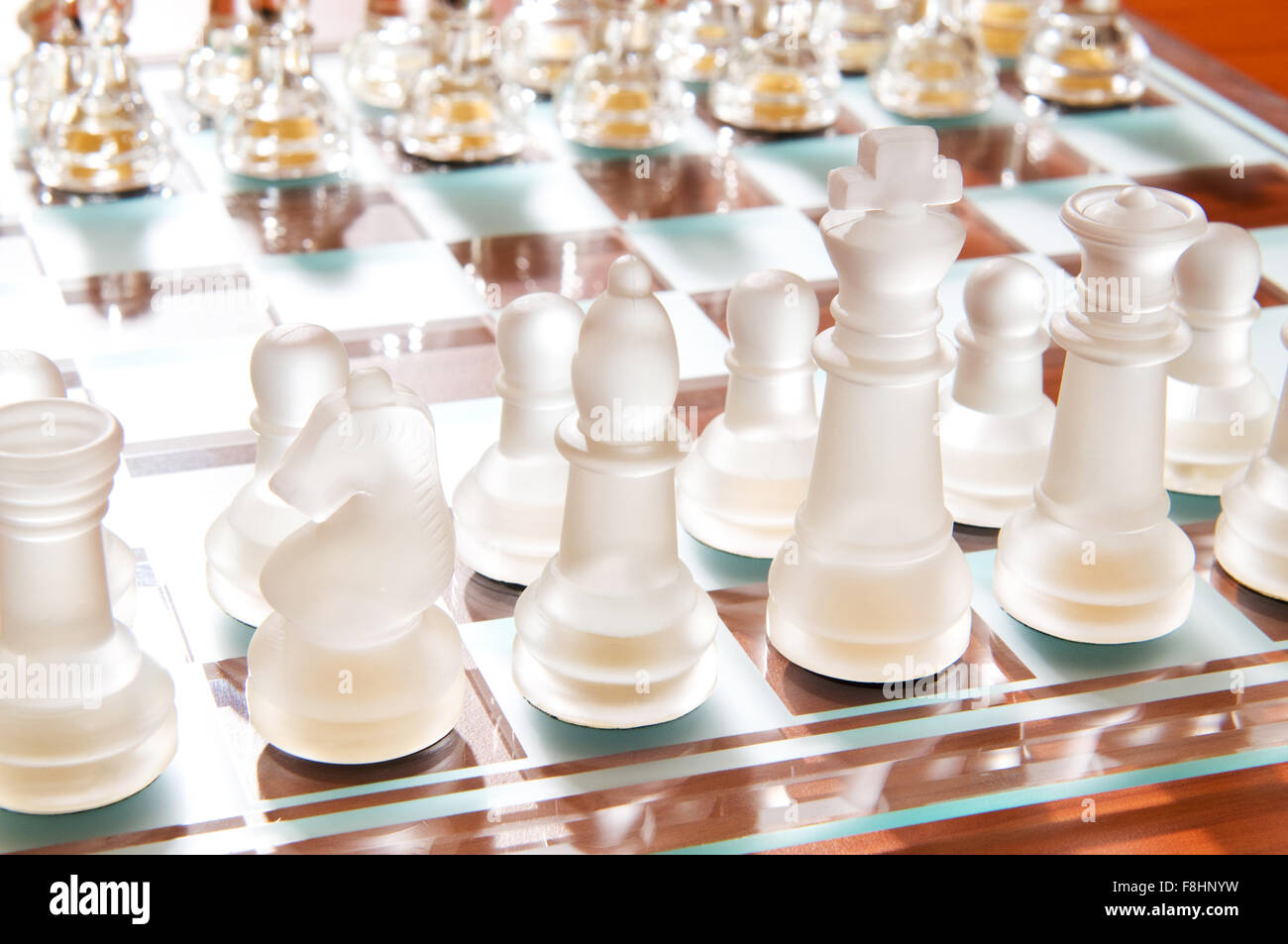 Set of chess figures on the playing board Stock Photo - Alamy