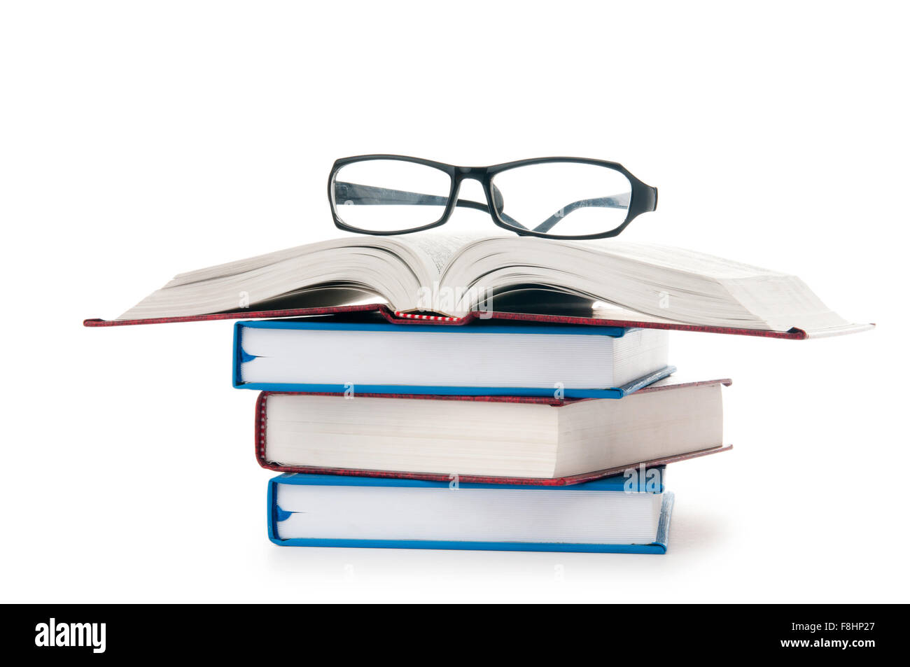 Reading glasses with books isolated on the white Stock Photo - Alamy