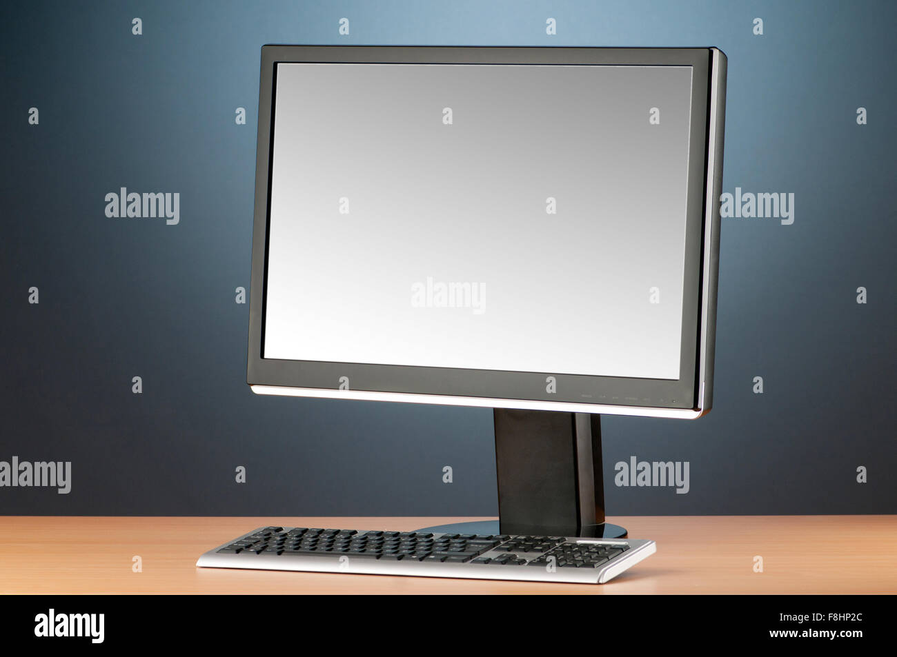 Wide screen computer monitor against colorful background Stock Photo ...