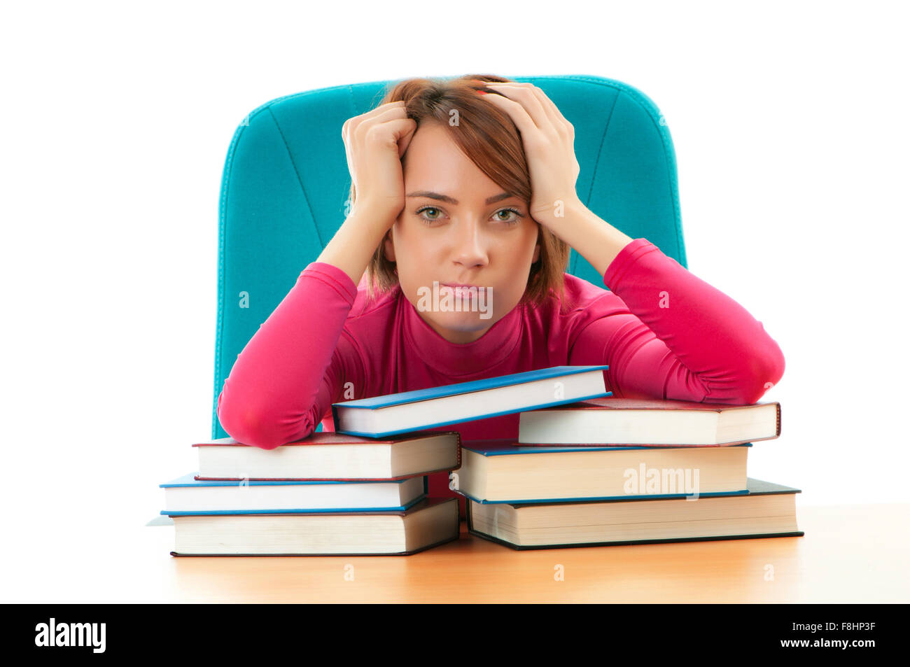Young female student with many study books Stock Photo - Alamy