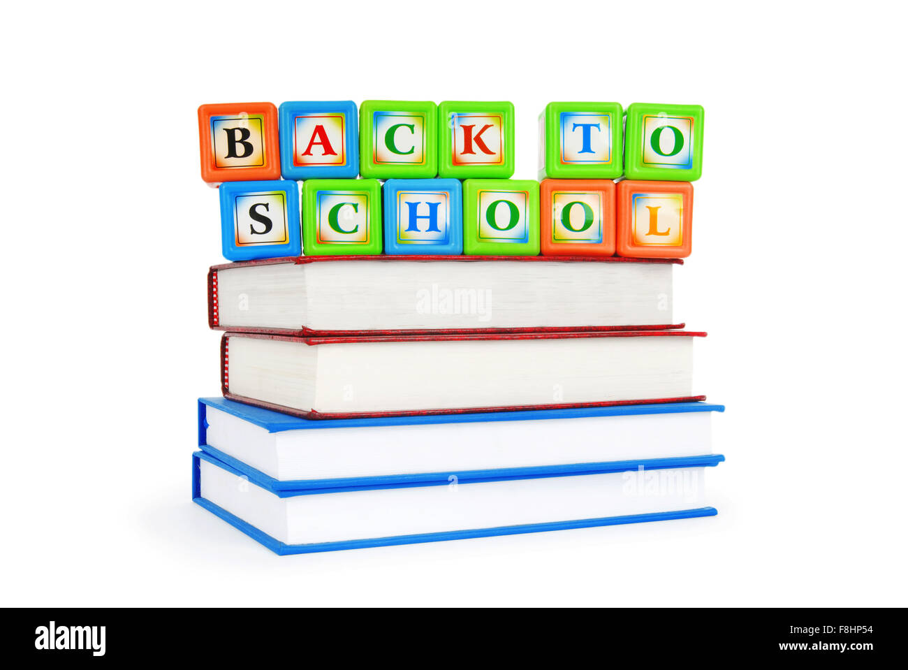 Books and alphabet blocks isolated on white Stock Photo - Alamy