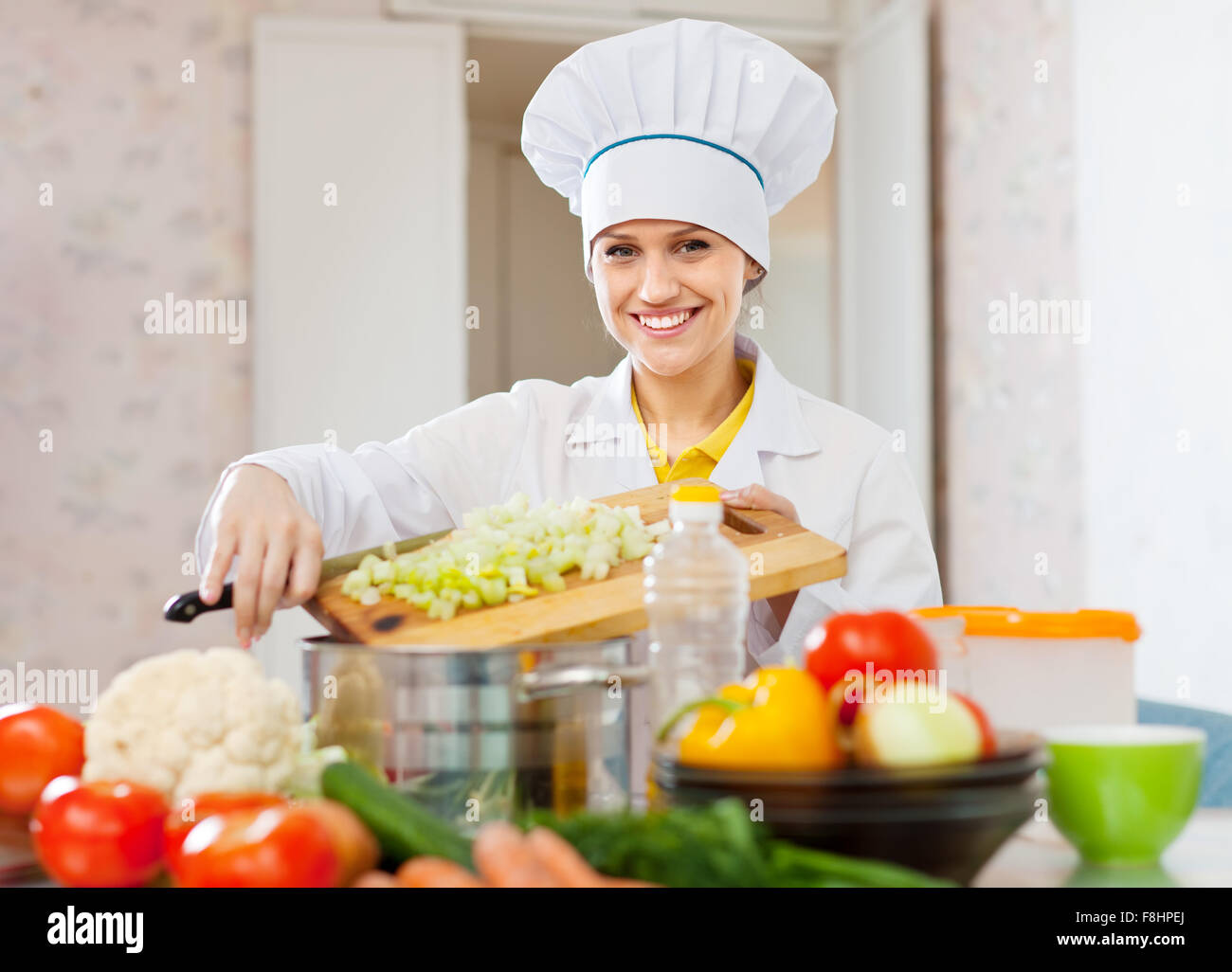 cook woman cooking vegetarian dinner at kitchen Stock Photo - Alamy