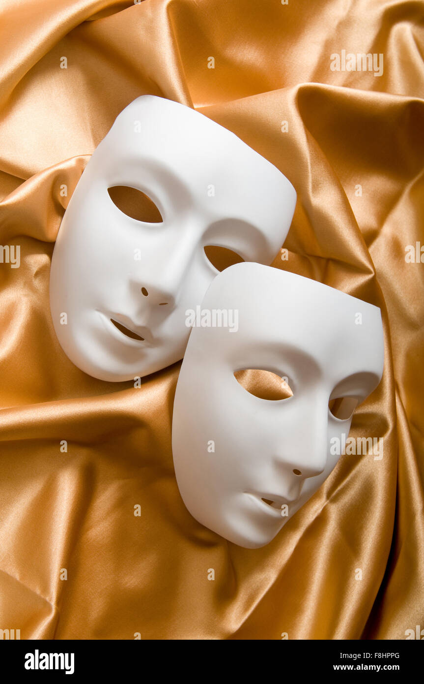 Theatre concept with the white plastic masks Stock Photo - Alamy