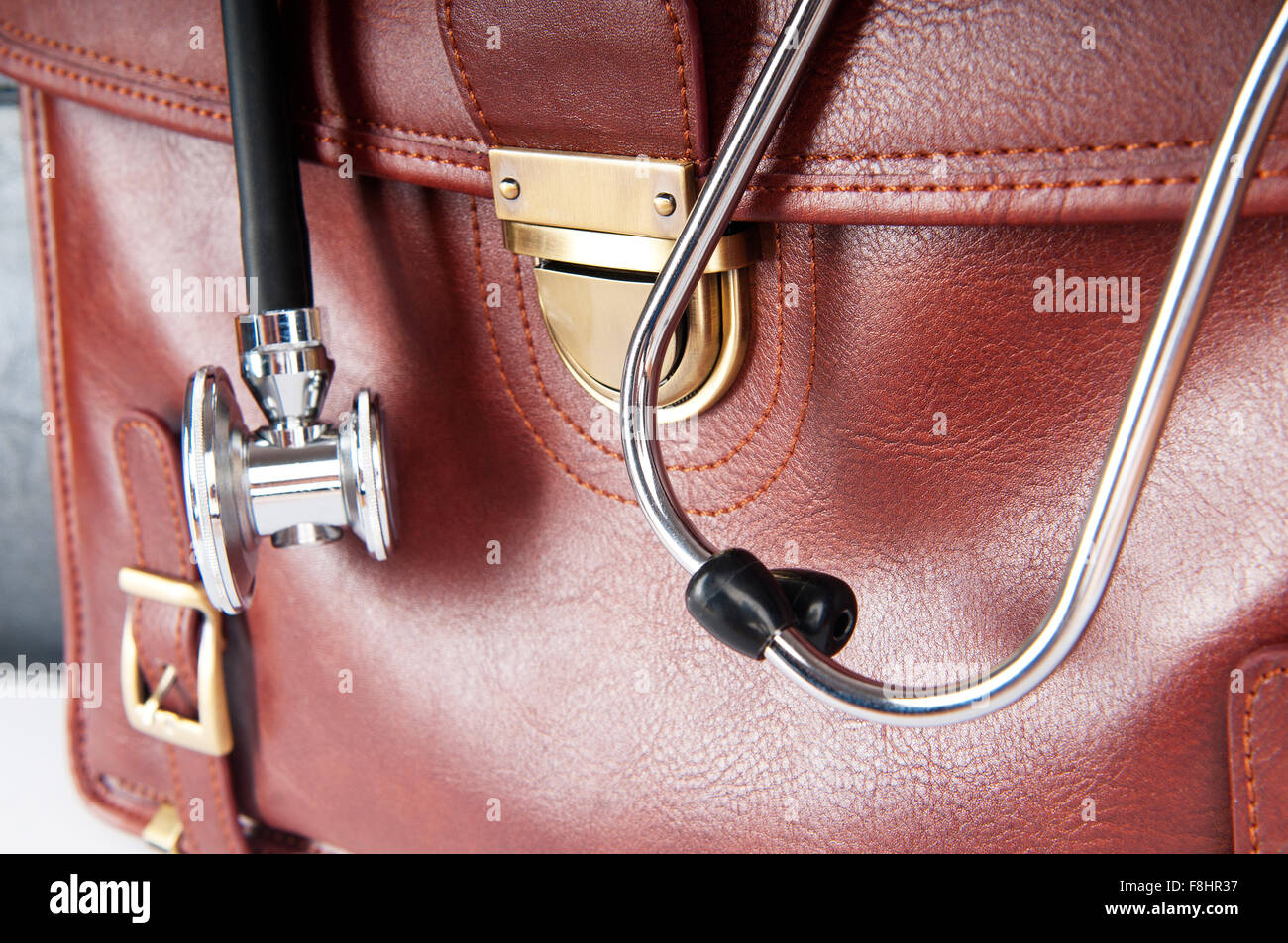 Leather briefcase and stethoscope hi-res stock photography and images ...
