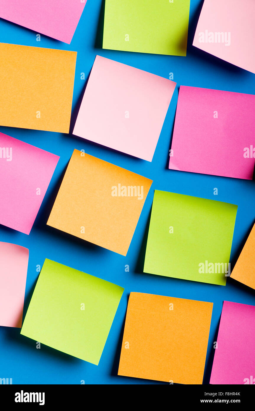 Reminder notes on the bright colorful paper Stock Photo - Alamy