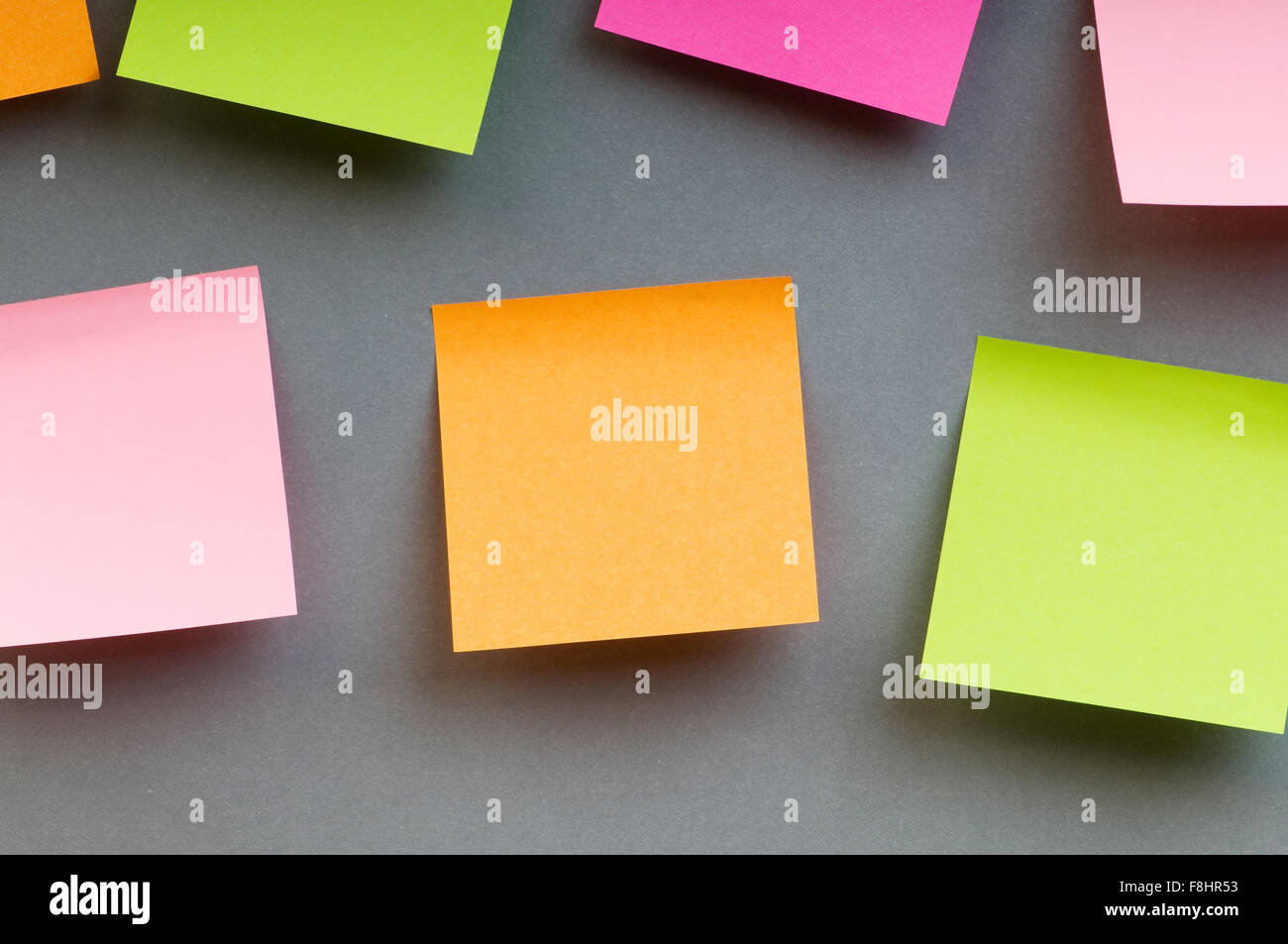 Reminder notes on the bright colorful paper Stock Photo - Alamy