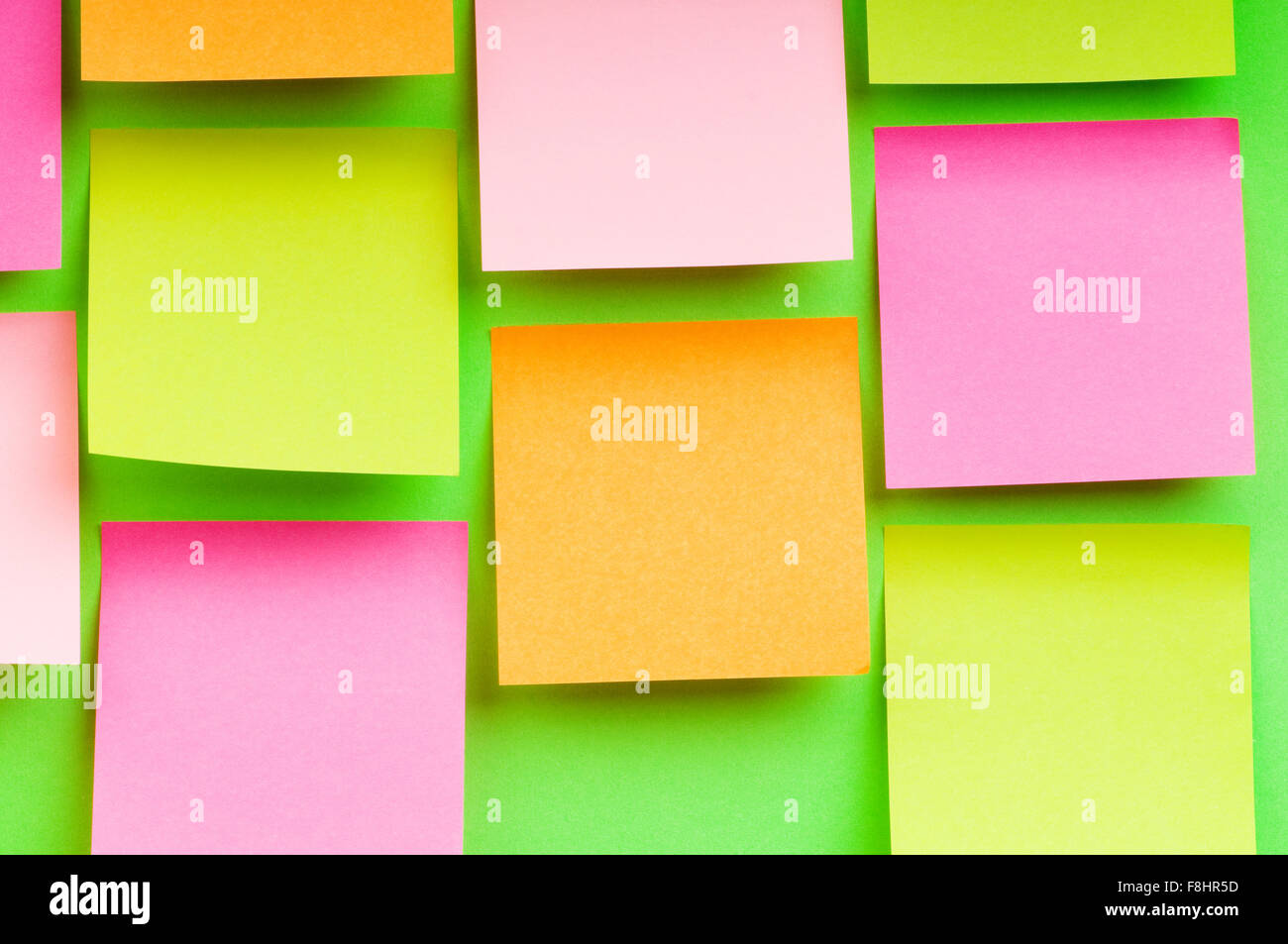 Reminder notes on the bright colorful paper Stock Photo - Alamy