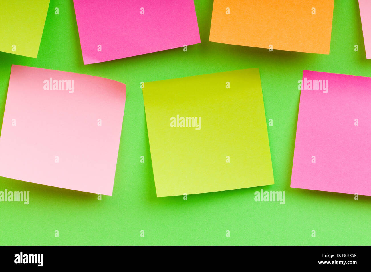 Reminder notes on the bright colorful paper Stock Photo - Alamy