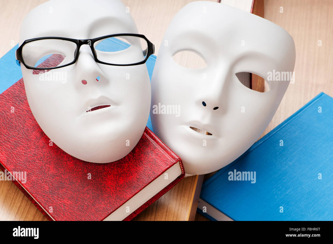 Reading concept with masks, books and glasses Stock Photo - Alamy
