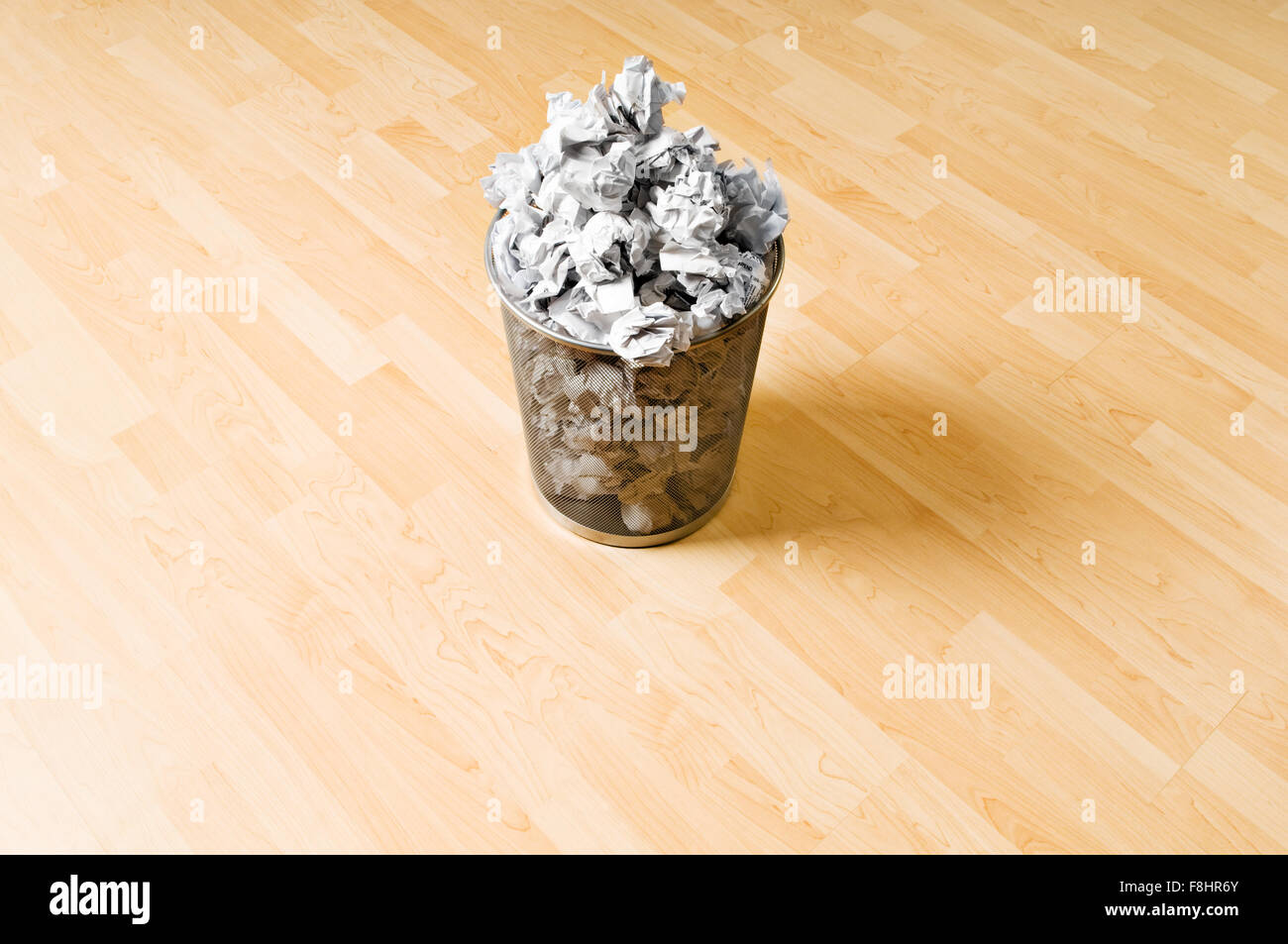 Garbage bin with paper waste isolated on white Stock Photo - Alamy