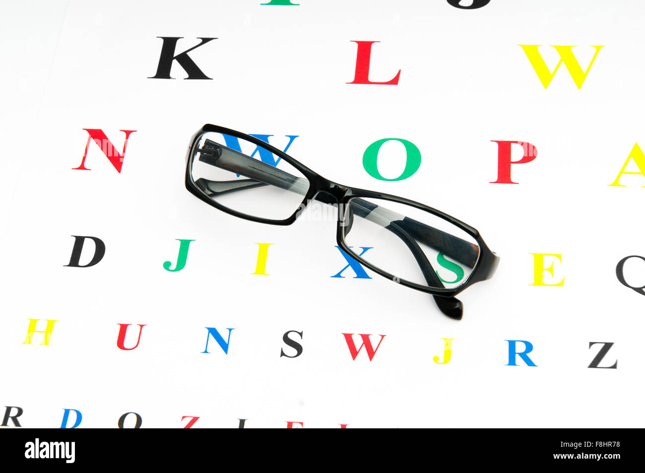 Optical reading glasses on the eyesight table Stock Photo - Alamy