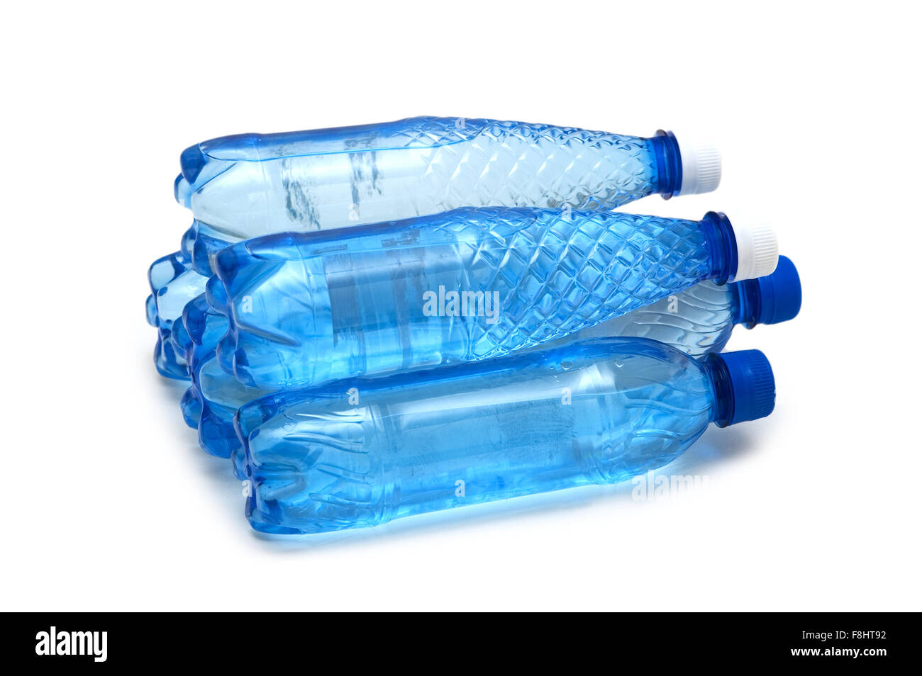 Stack of water bottles isolated on white Stock Photo - Alamy