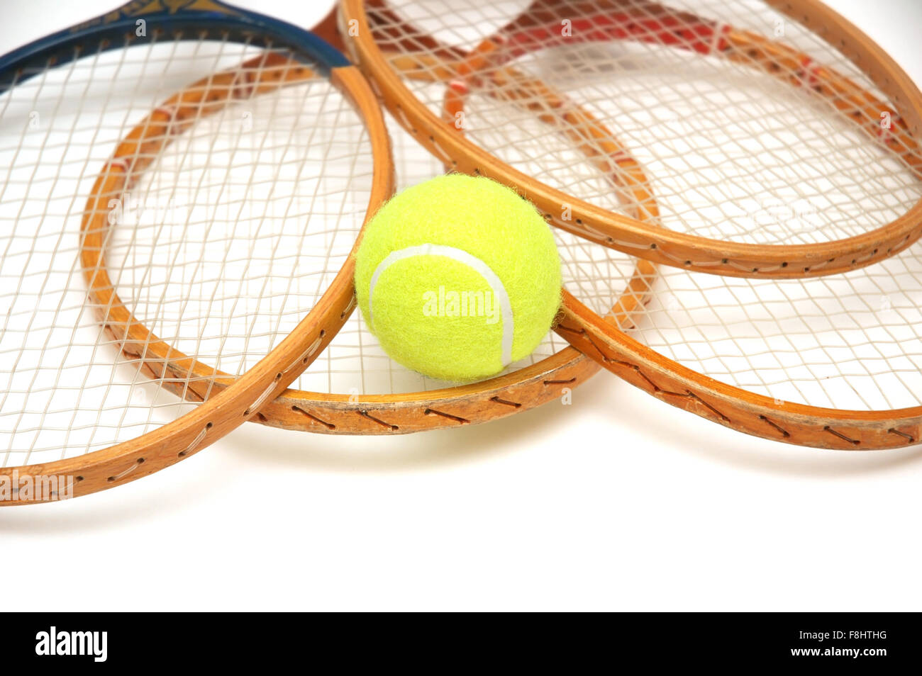 Tennis rackets and ball isolated on white Stock Photo - Alamy