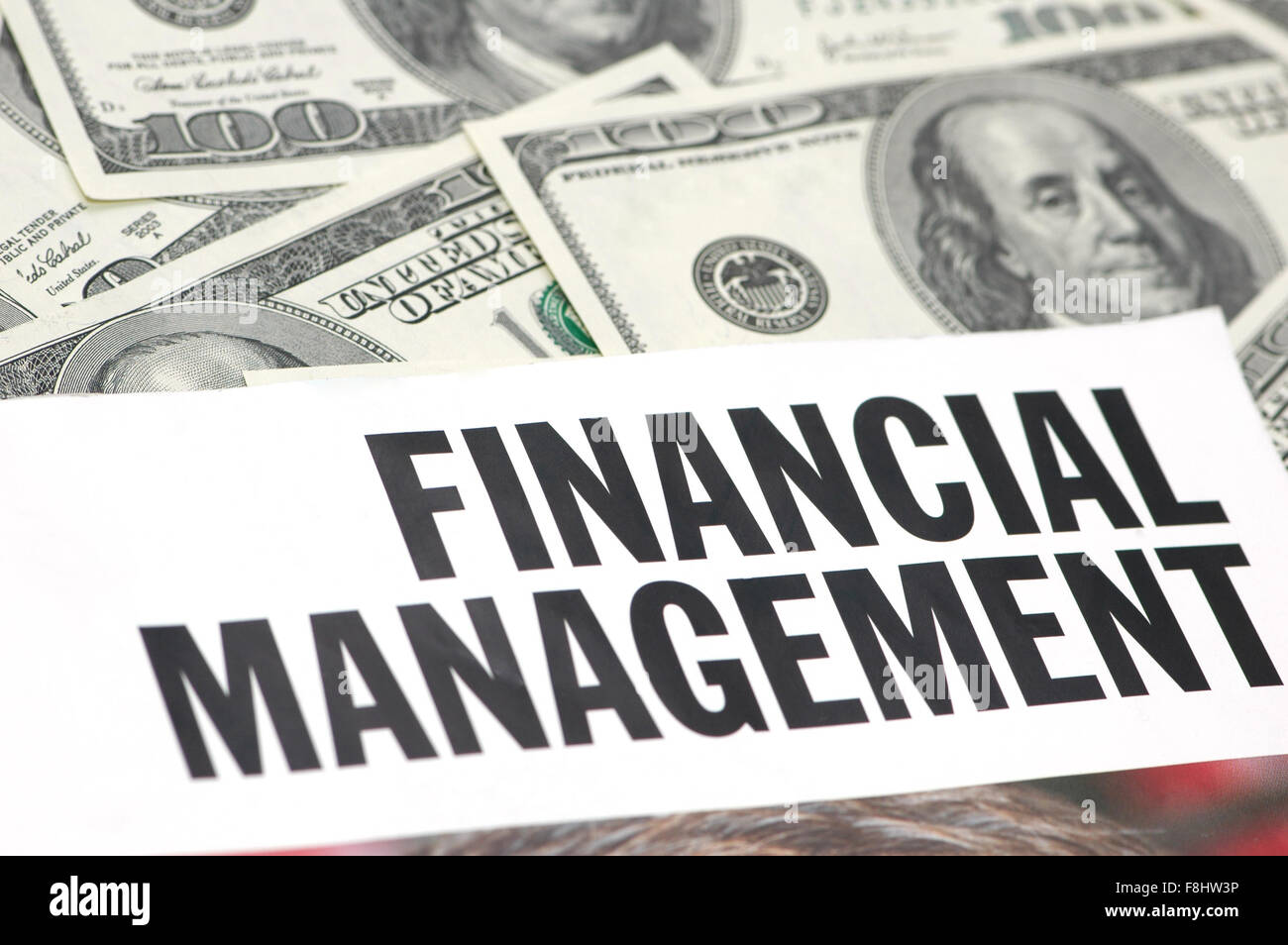 Close up of newspaper heading and dollar notes Stock Photo - Alamy