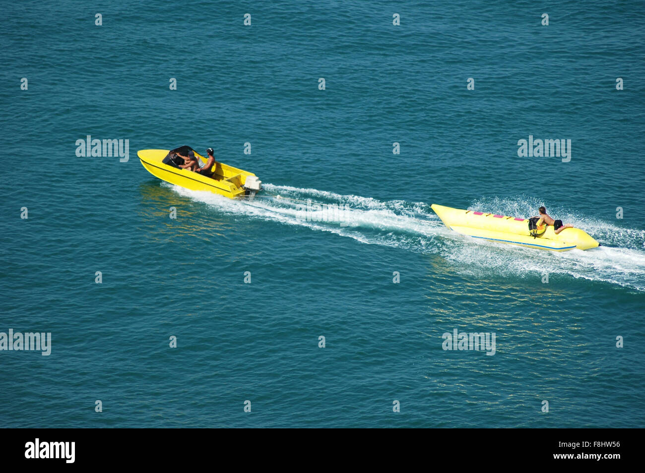 Motor boat making a turn in the sea Stock Photo - Alamy