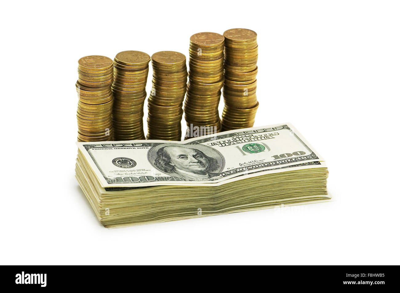 Stack of dollars and coins isolated on white Stock Photo - Alamy