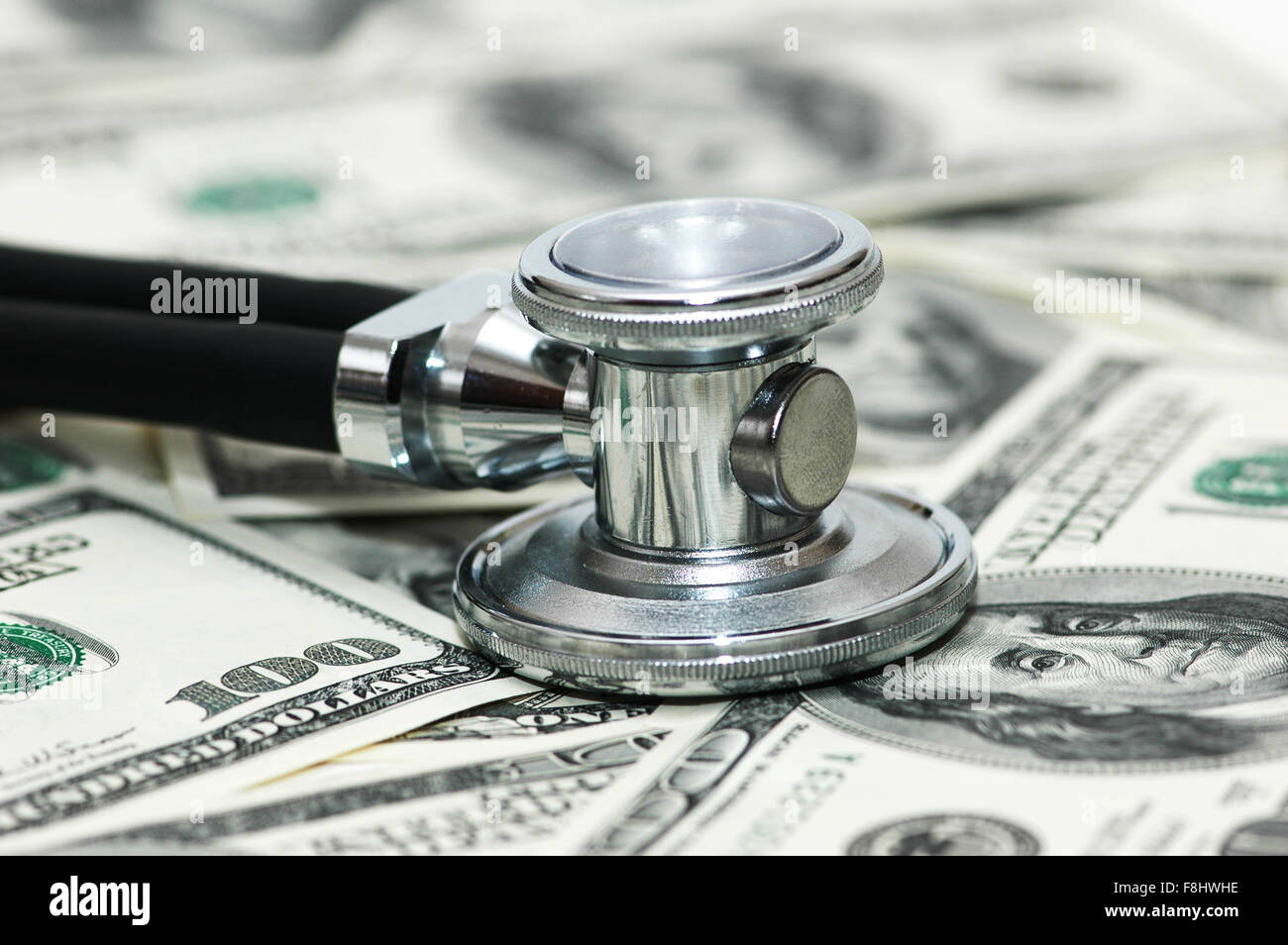 Stethoscope and dollars illustrating expensive healthcare Stock Photo ...