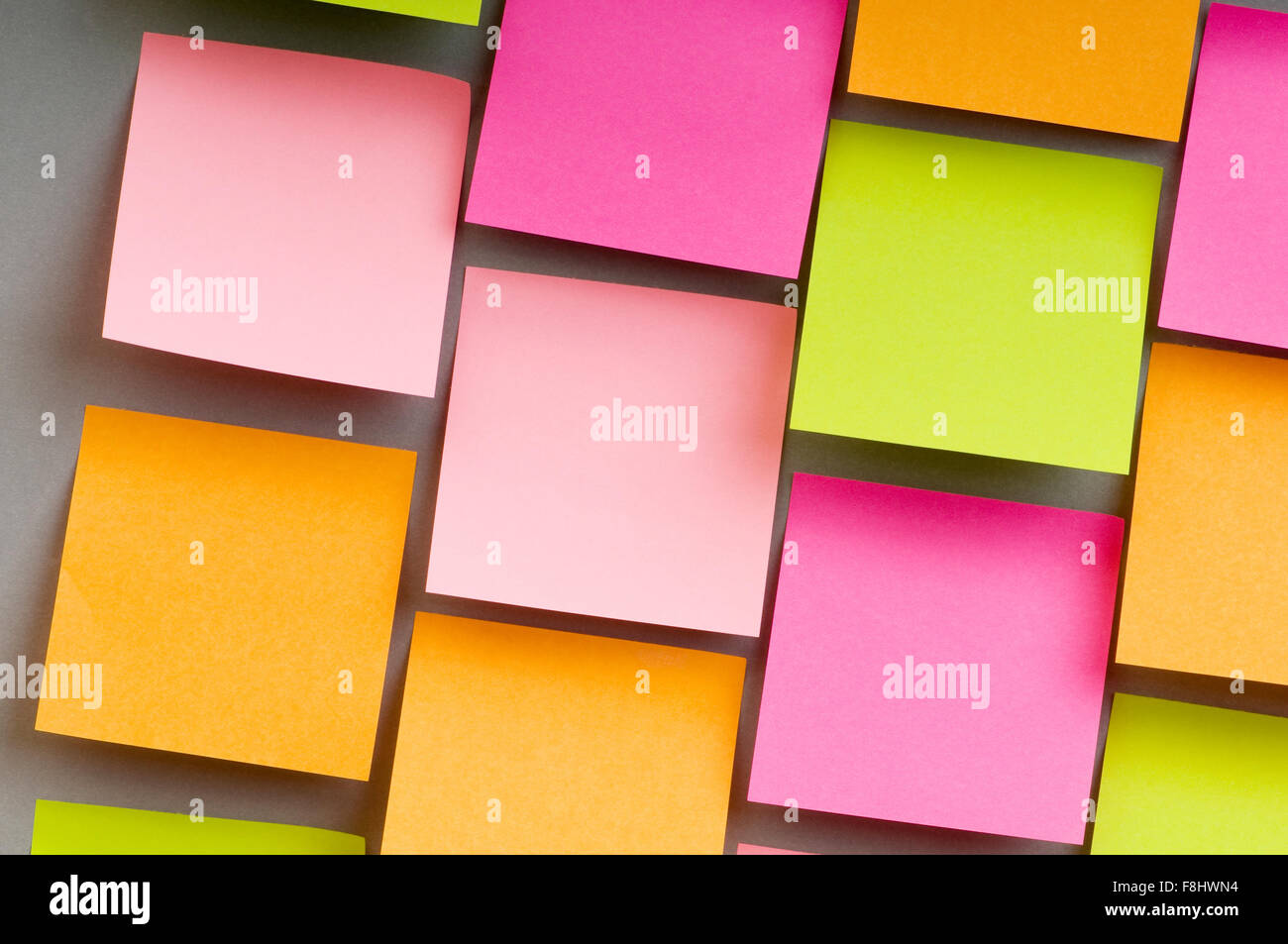 Reminder notes on the bright colorful paper Stock Photo - Alamy