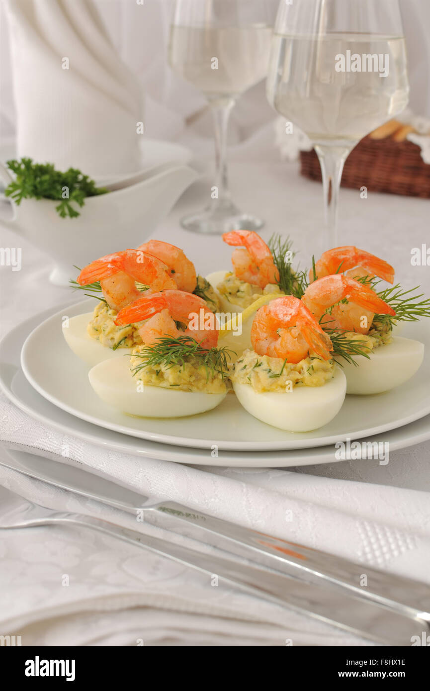 eggs stuffed with spicy stuffing with grilled shrimp Stock Photo - Alamy