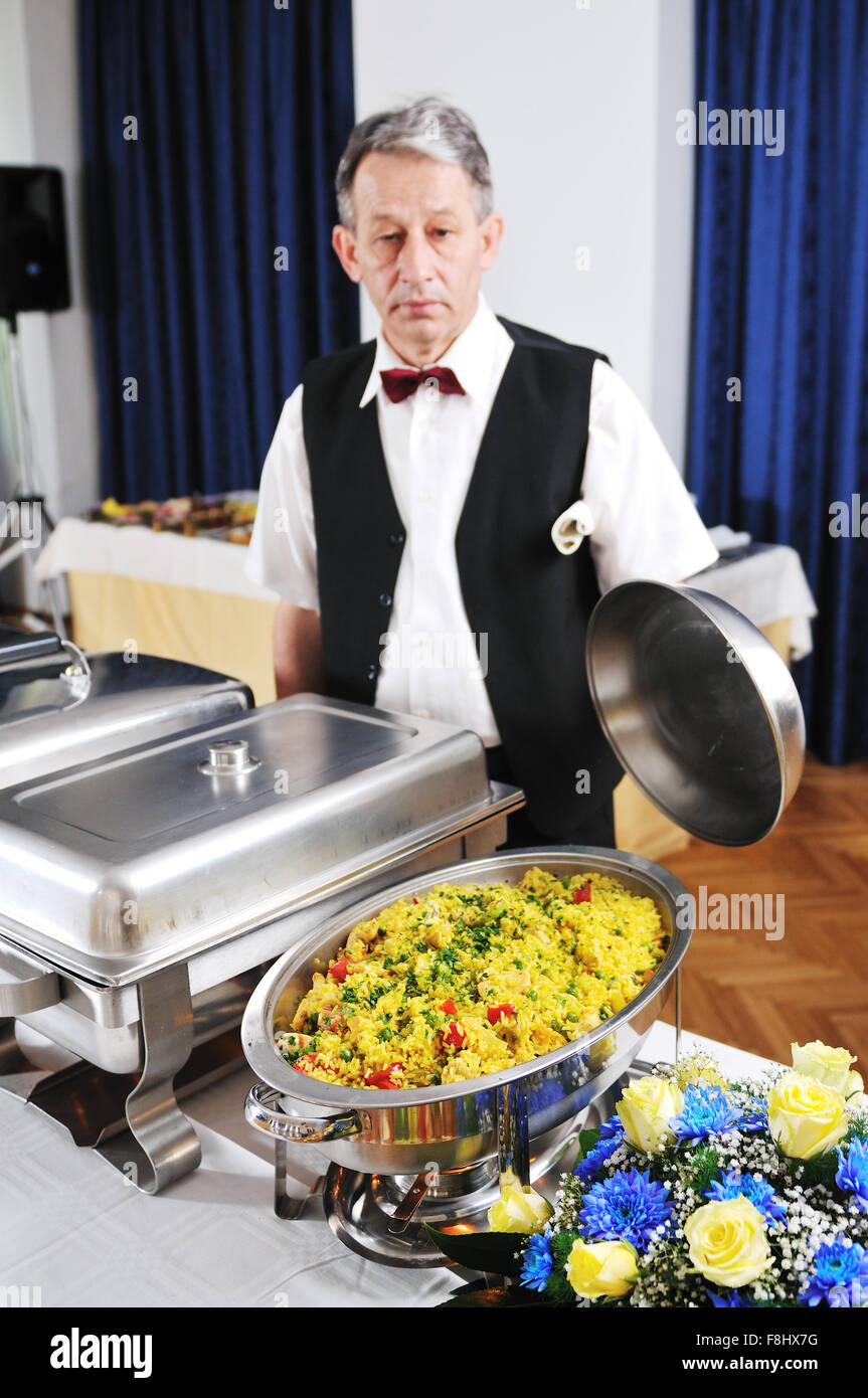 catering buffet food party preparation man Stock Photo - Alamy