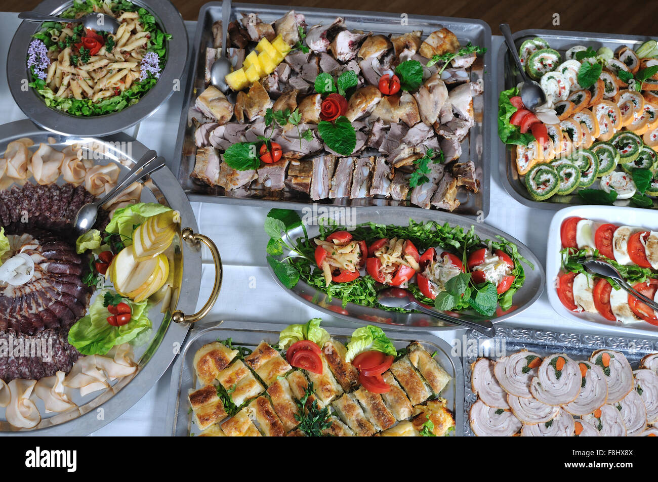 buffet catering food arangement on table Stock Photo - Alamy