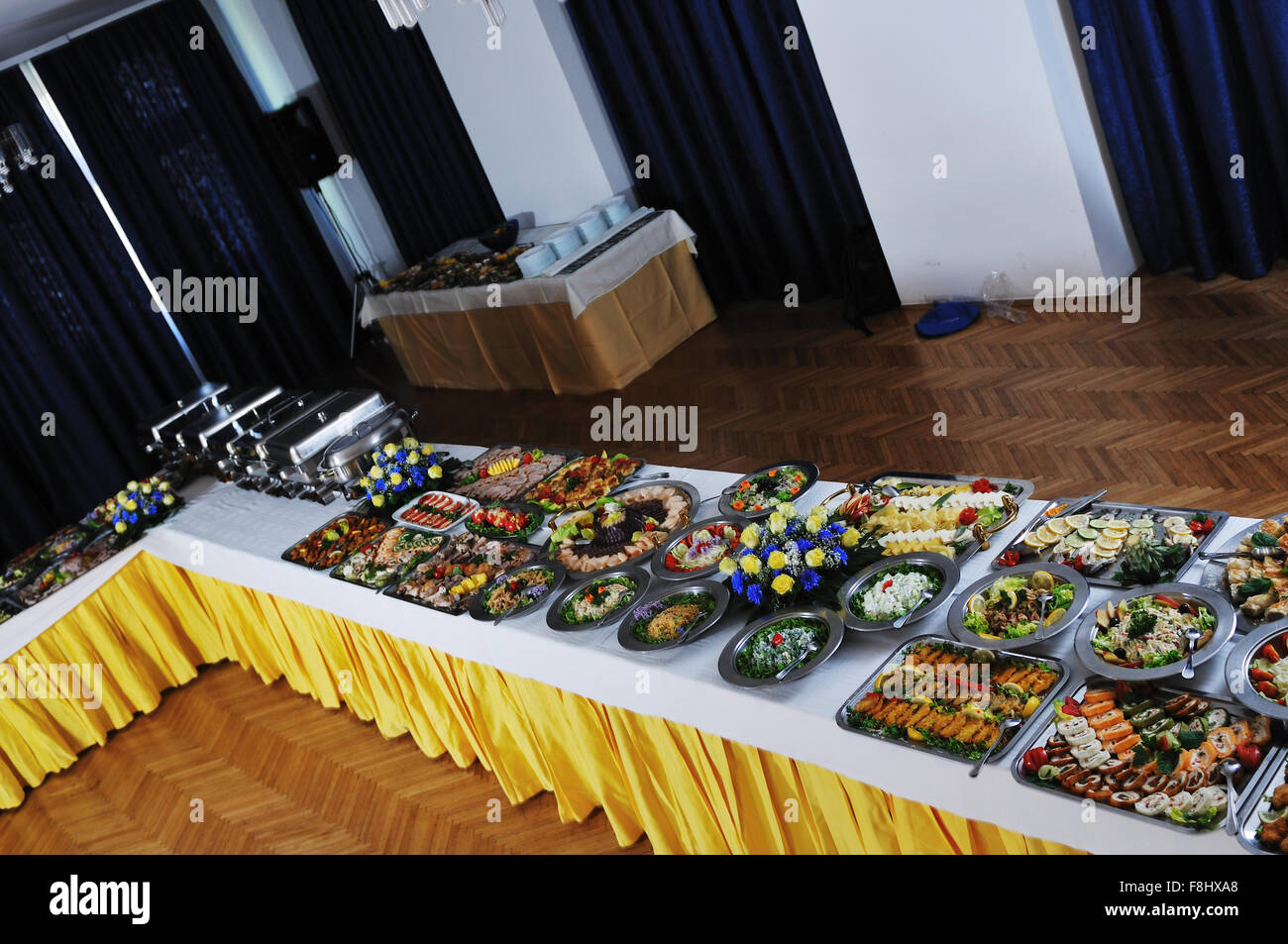 buffet catering food arangement on table Stock Photo - Alamy