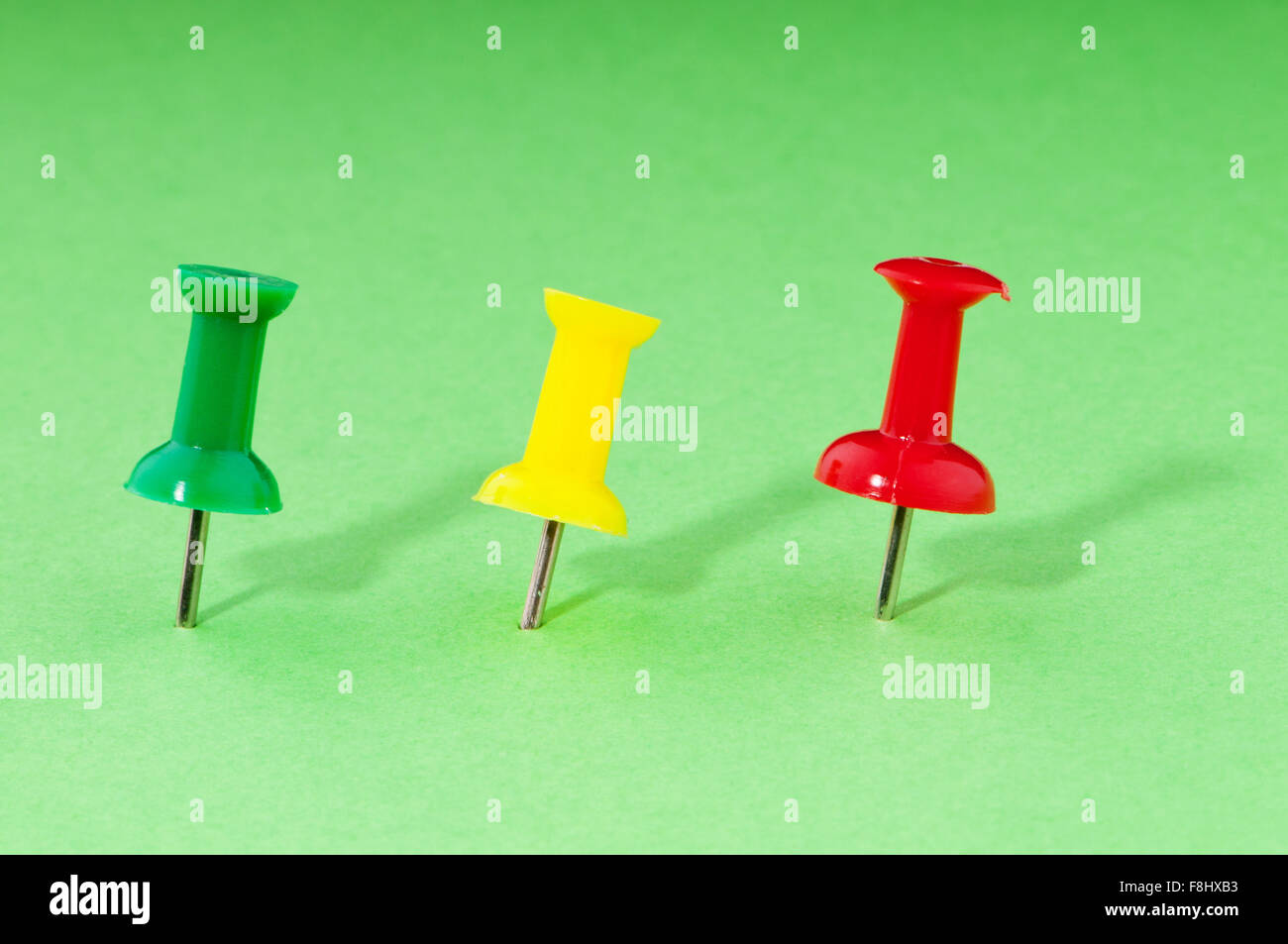 Office pins on the paper Stock Photo - Alamy