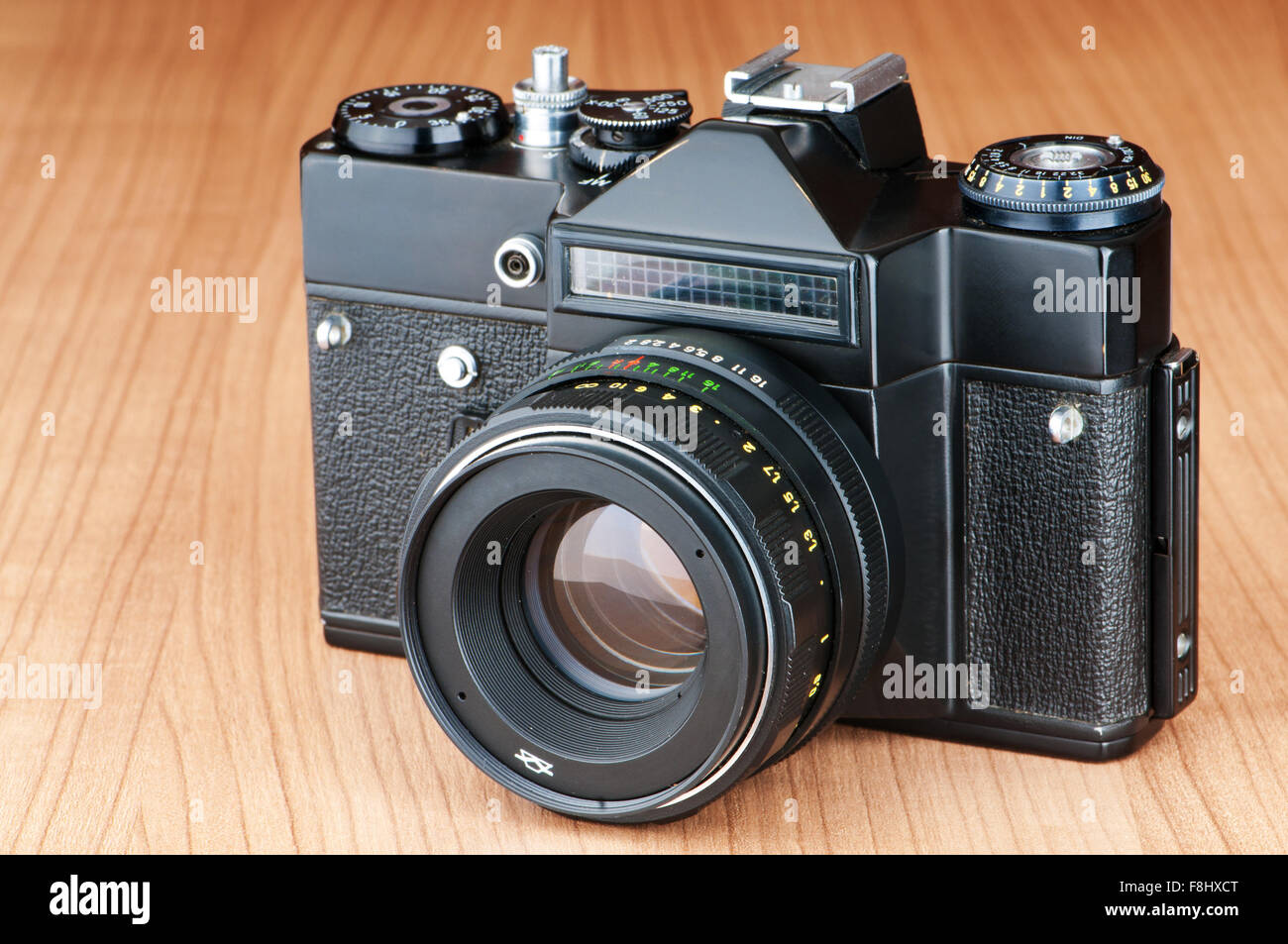 Vintage film camera against gradient background Stock Photo - Alamy