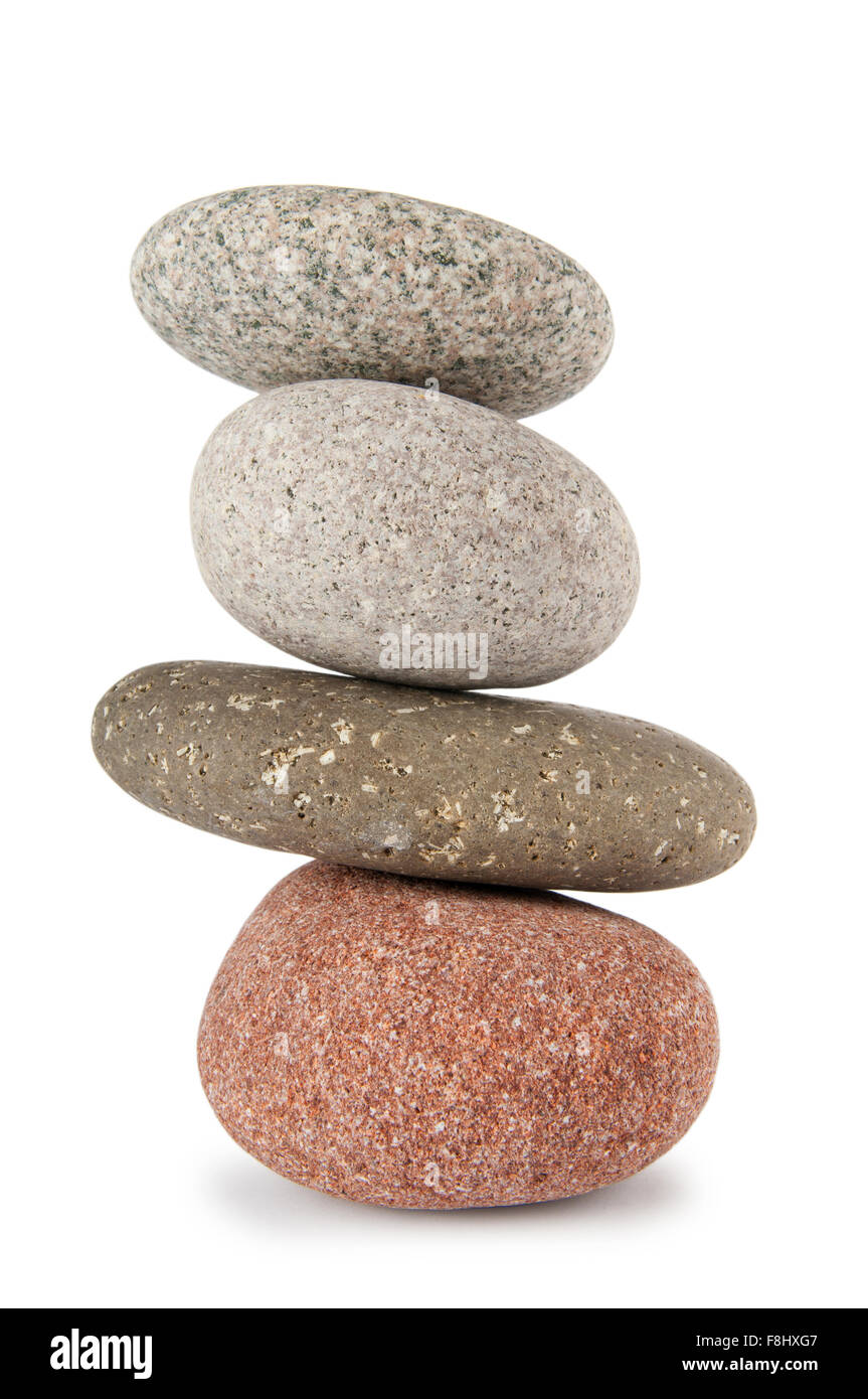 Stack of pebbles isolated on the white Stock Photo - Alamy