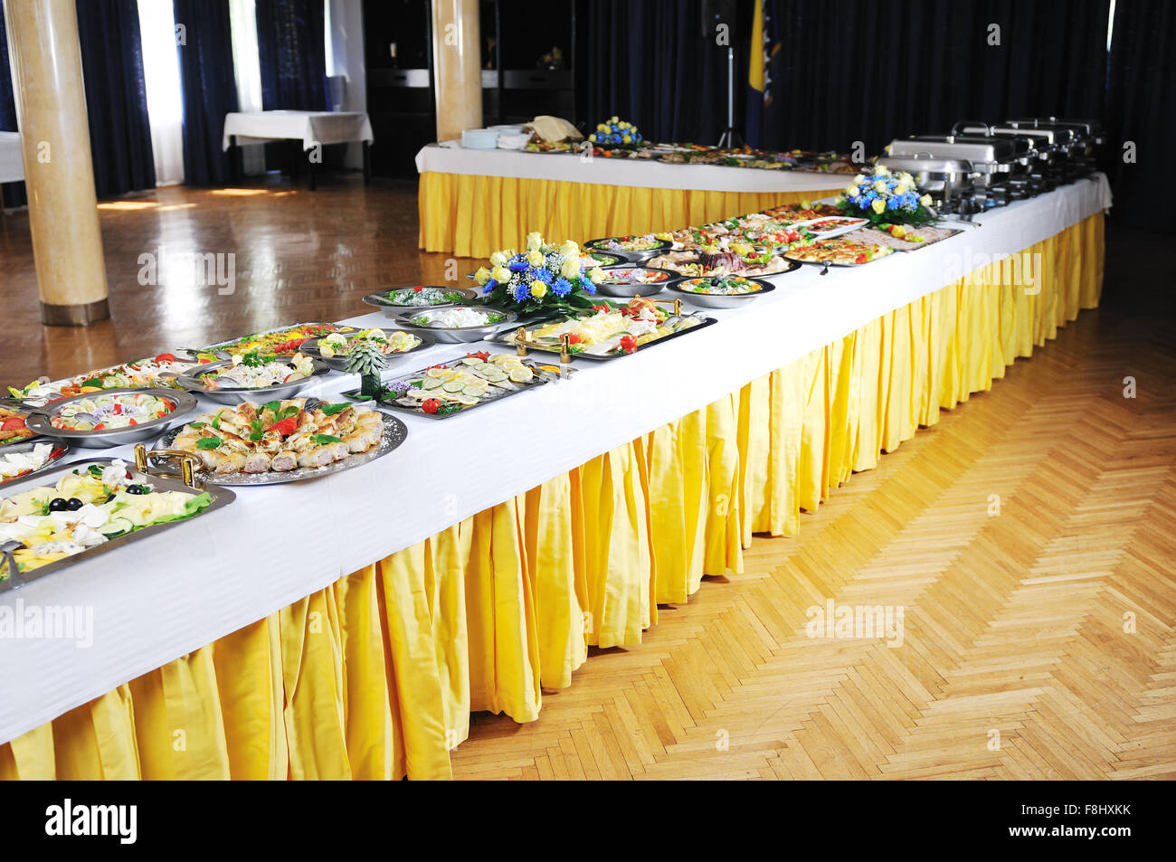 buffet catering food arangement on table Stock Photo - Alamy
