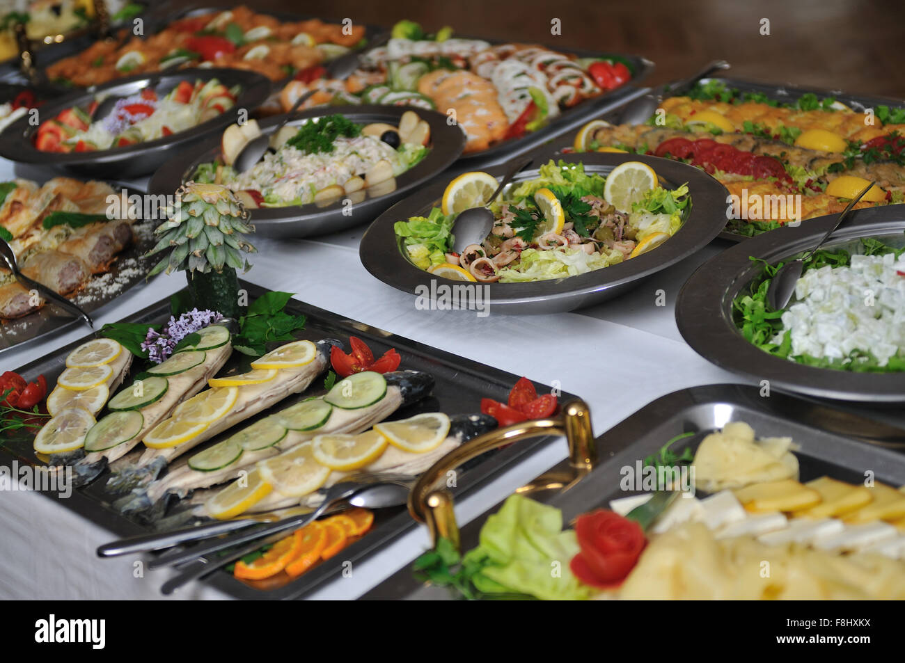 buffet catering food arangement on table Stock Photo - Alamy