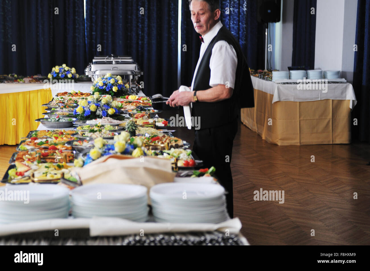 catering buffet food party preparation man Stock Photo - Alamy