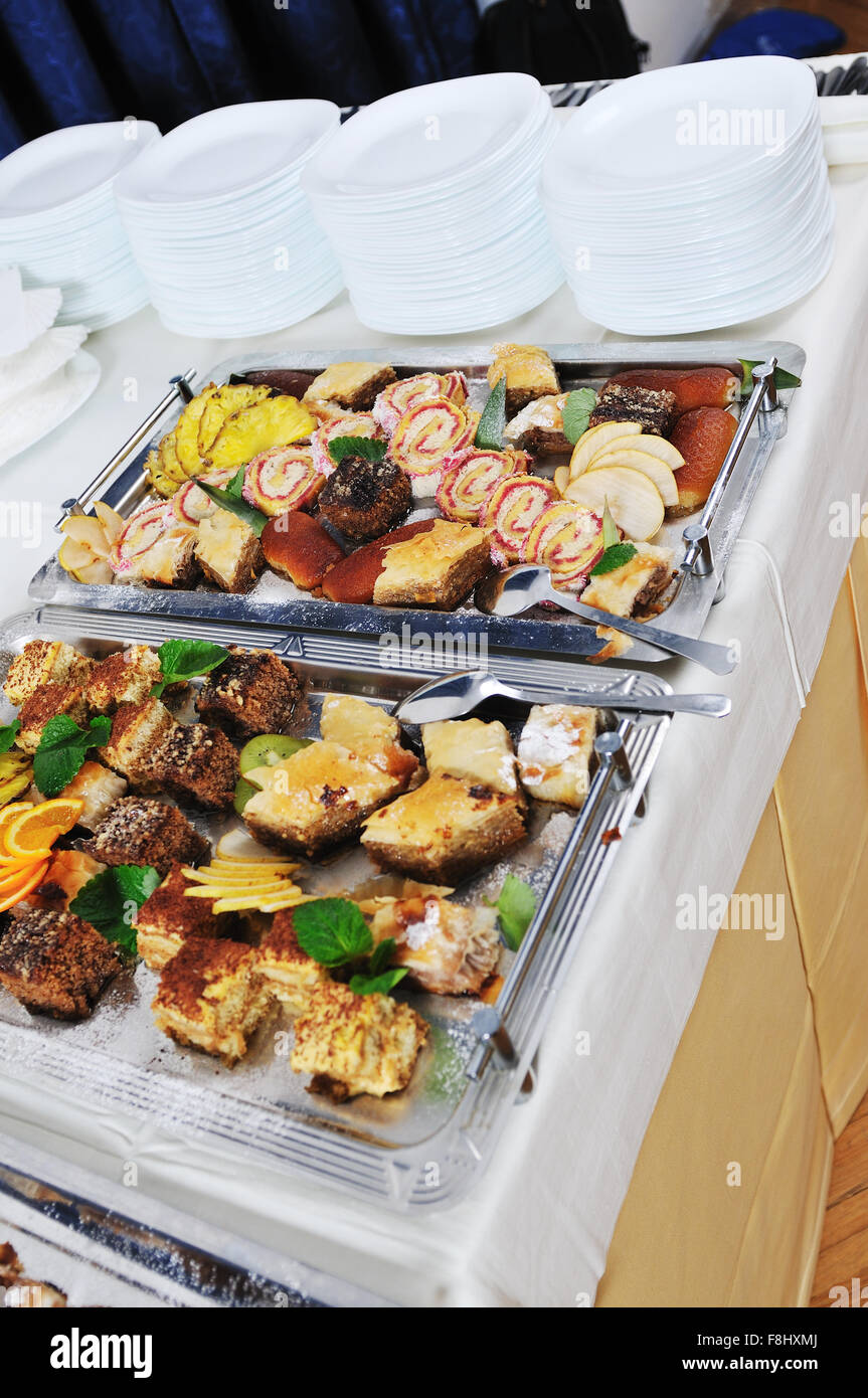 buffet catering food arangement on table Stock Photo - Alamy