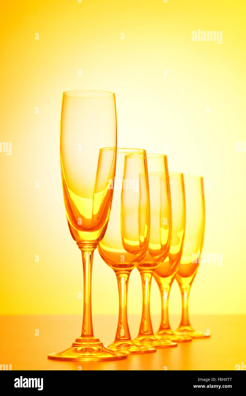 Wine glasses against gradient background Stock Photo - Alamy